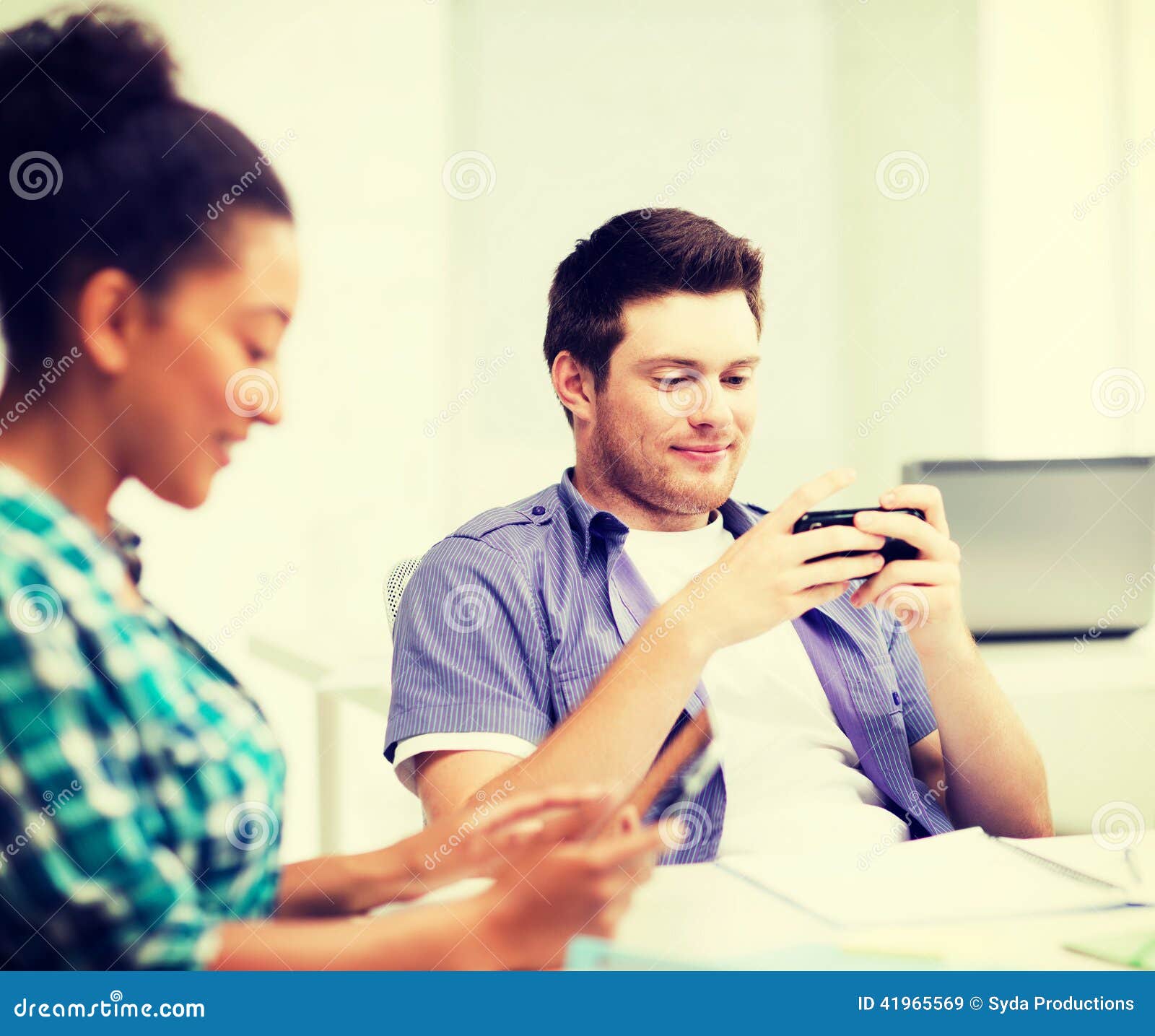 Students Looking at Devices at School Stock Image - Image of classmates ...