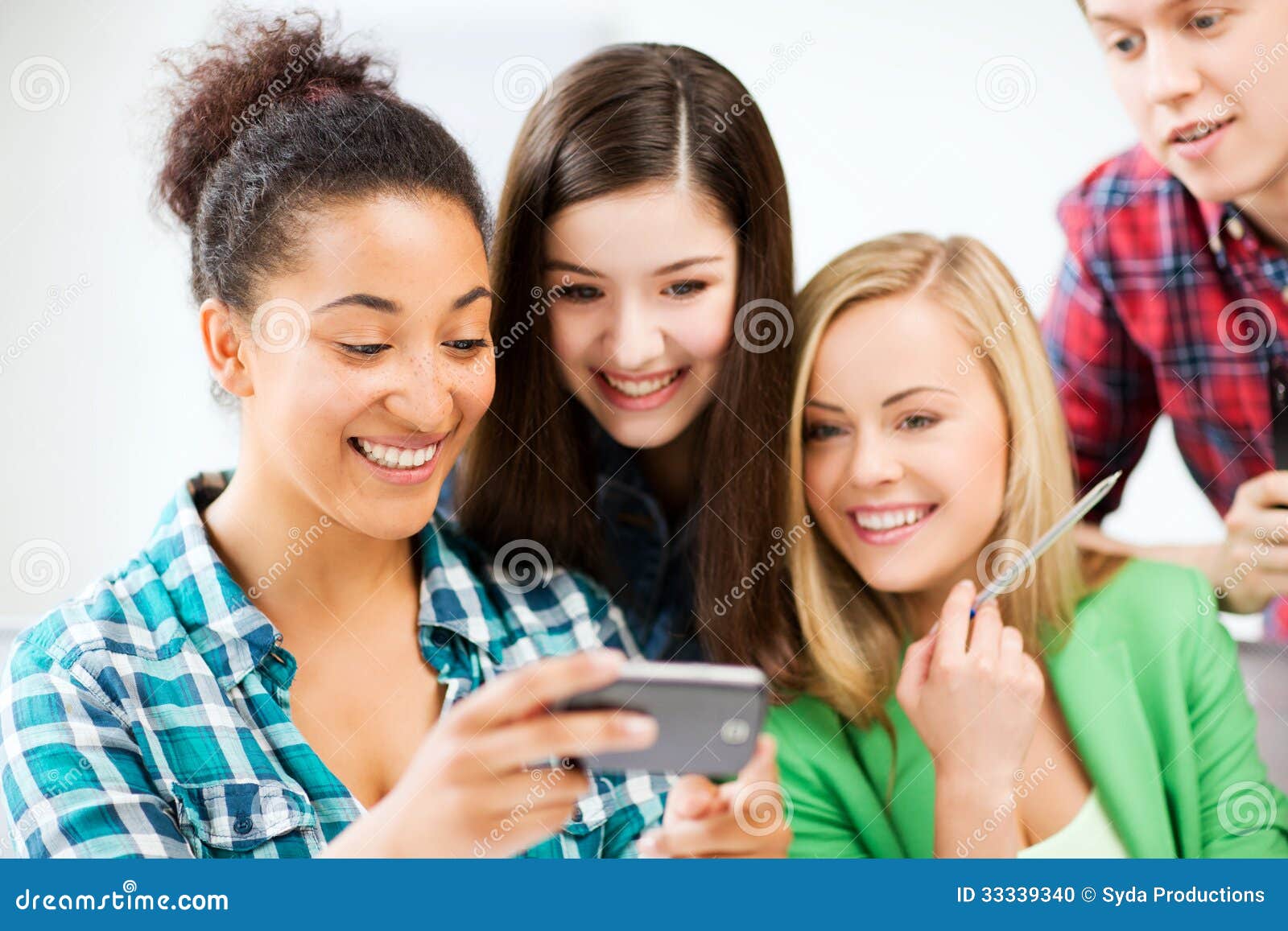 Students Looking at Smartphone at School Stock Photo - Image of boys ...