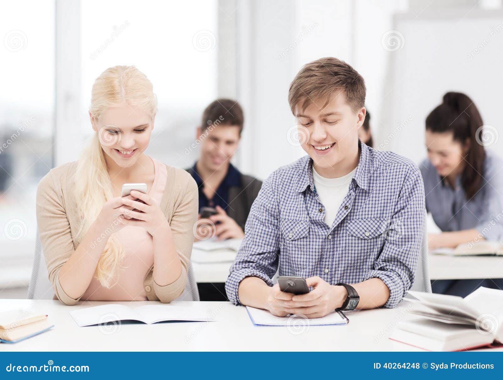 Students Looking into Smartphone at School Stock Photo - Image of ...