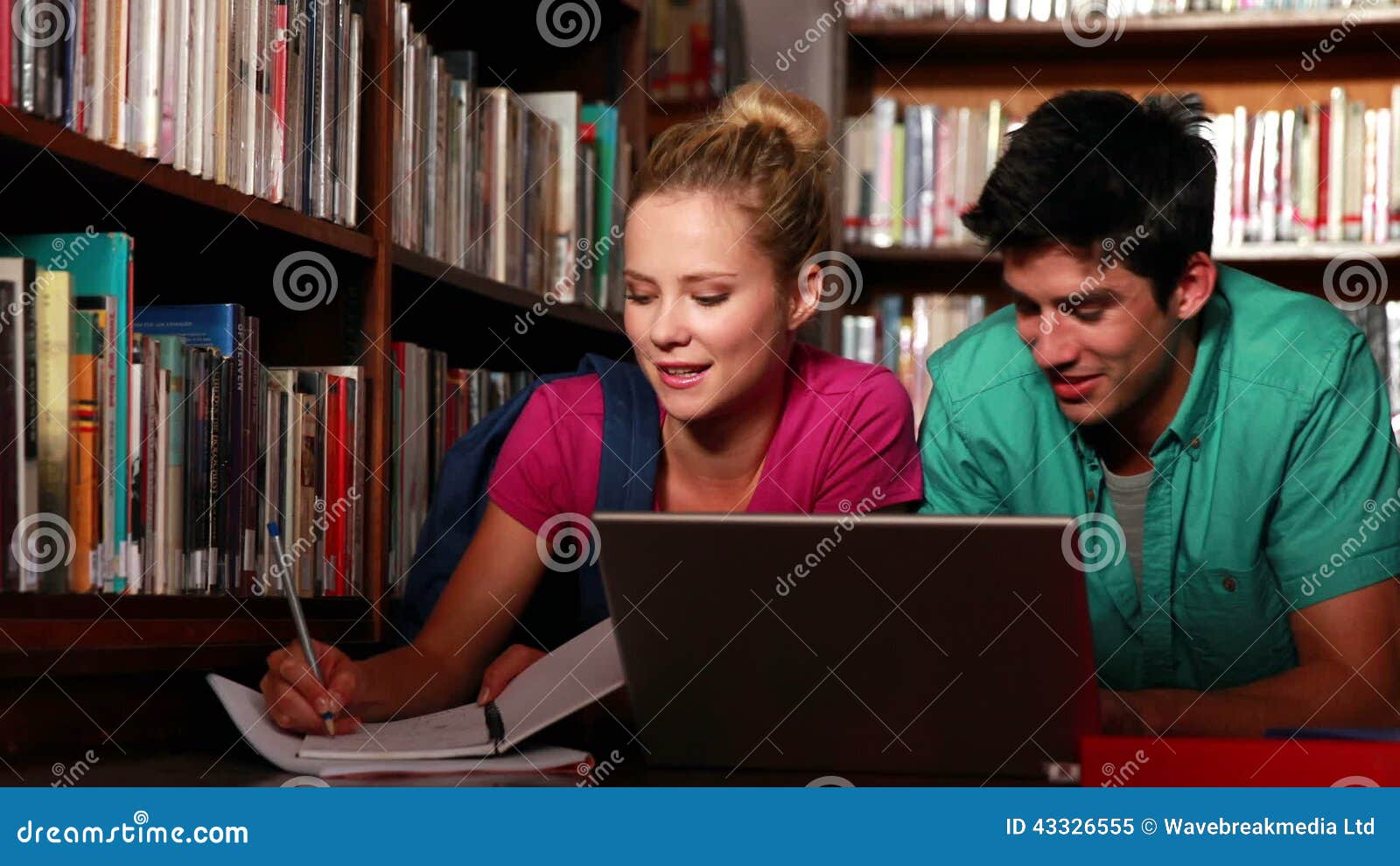 Students Lying on Library Floor Studying Together Stock Video - Video ...