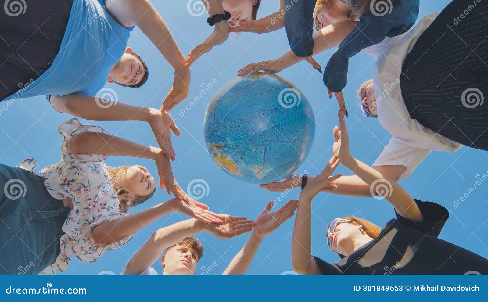 Students Make a Circle Around the Globe of the World. the Concept of ...