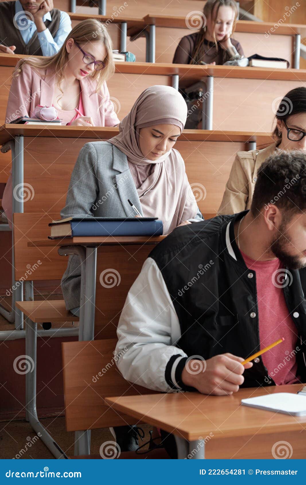 Students Making Notes while Working Individually Stock Image - Image of ...