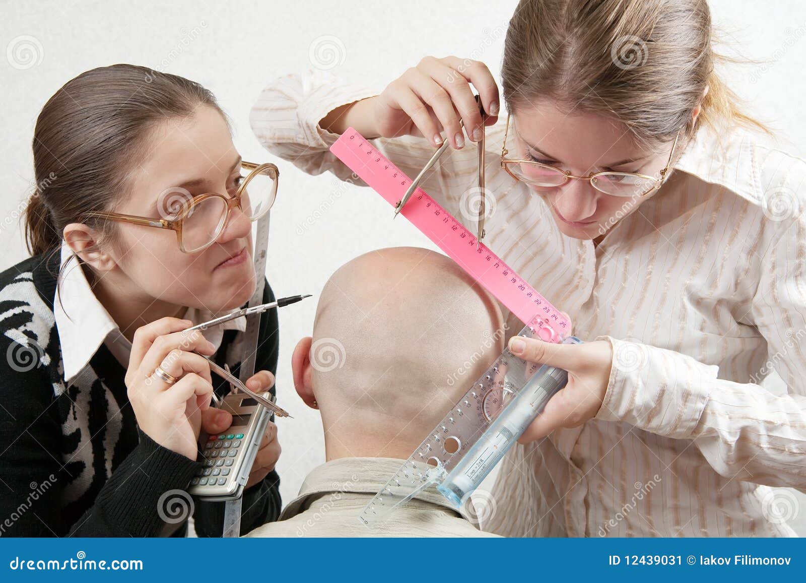 Students measuring a head stock image. Image of studying - 12439031