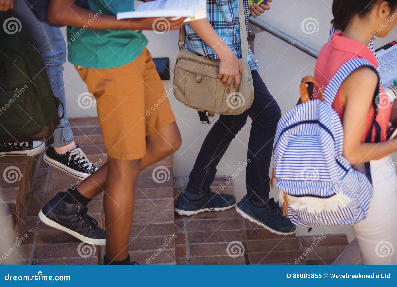 Students Moving Down Staircase Stock Photo - Image of education ...