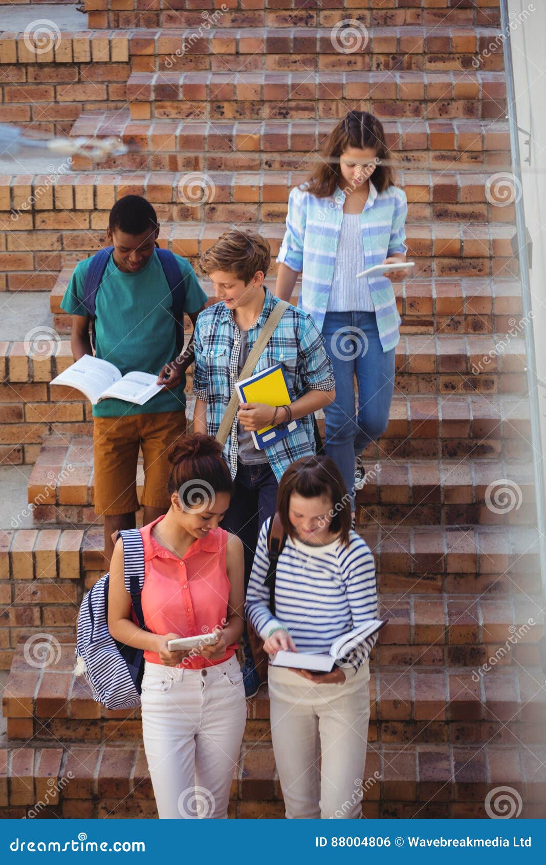 Students Moving Down Staircase Stock Photo - Image of confidence ...
