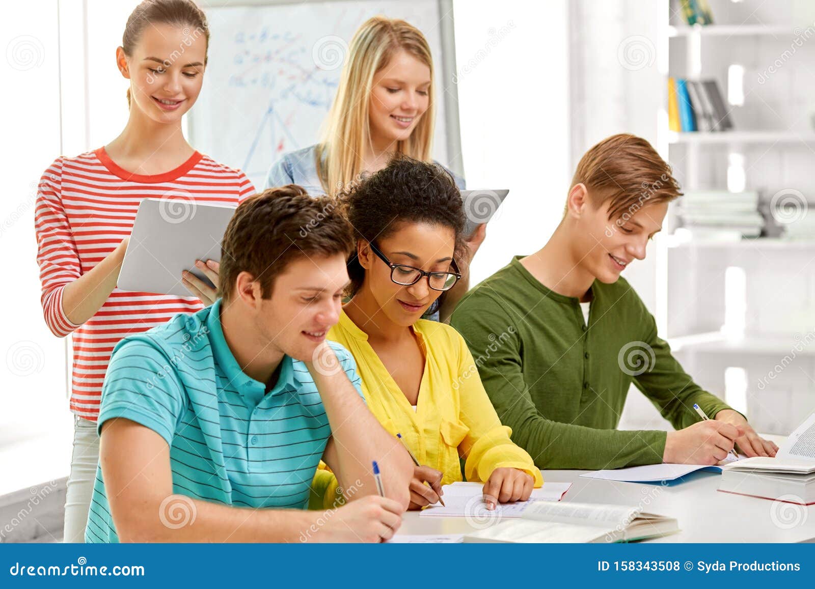 Students with Notebooks and Tablet Pc at School Stock Photo - Image of ...