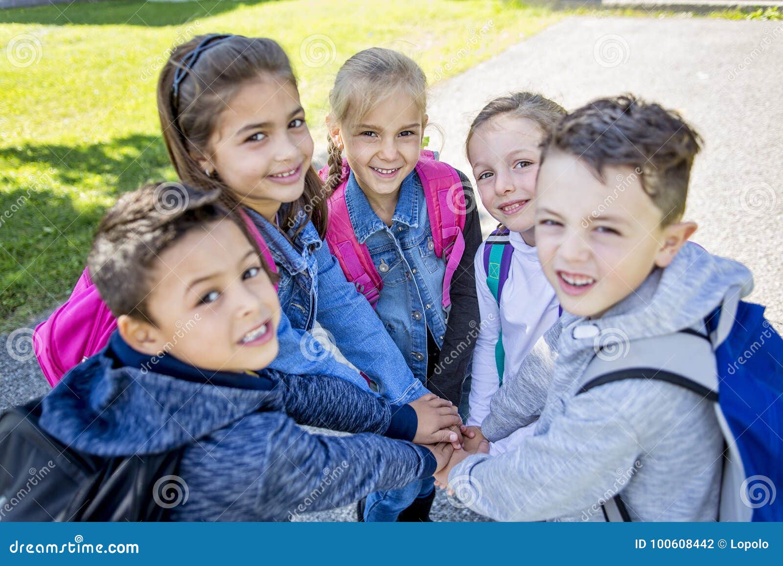 Students Outside School Standing Together Stock Photo - Image of group ...