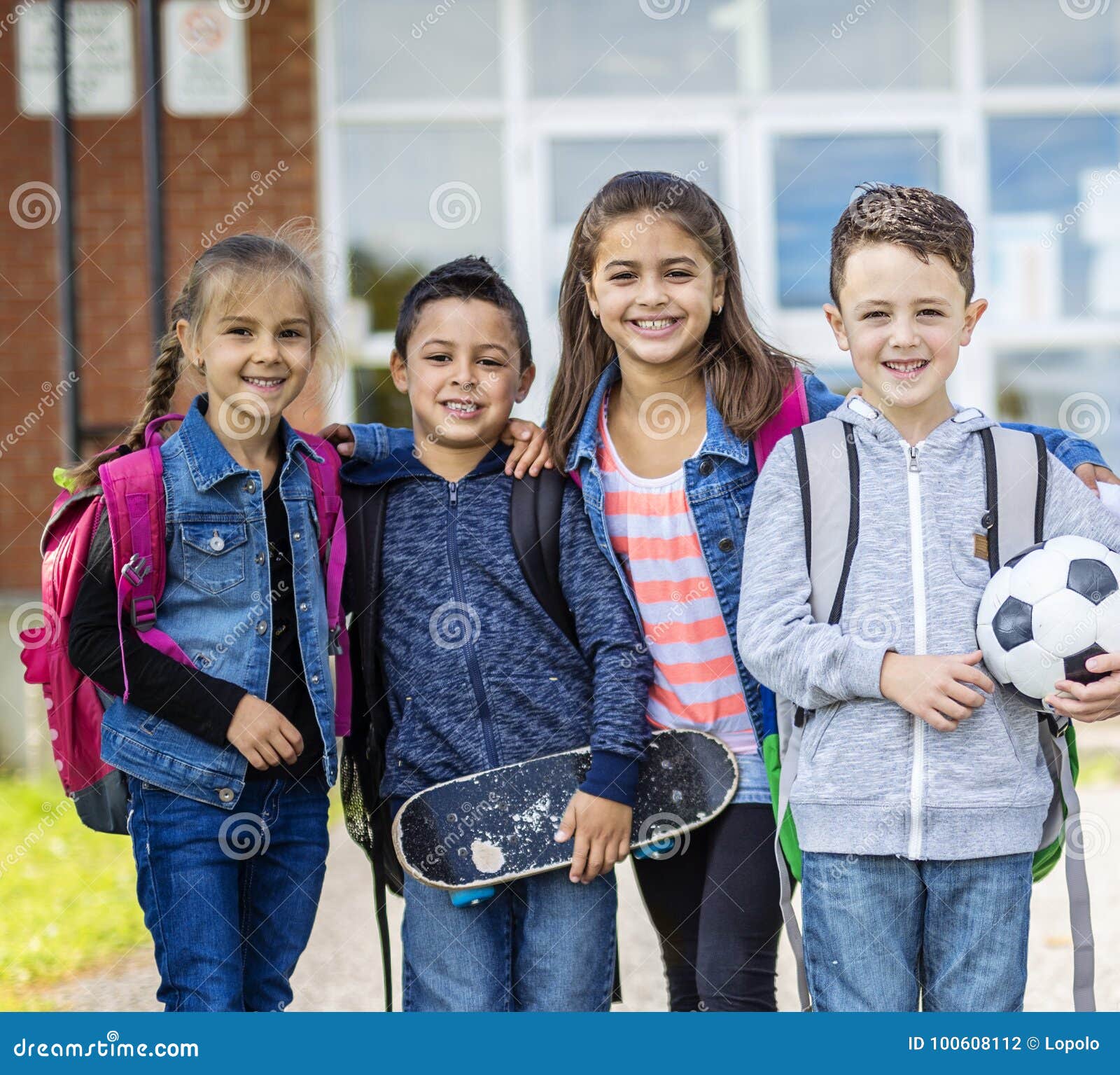 Students Outside School Standing Together Stock Photo - Image of ...