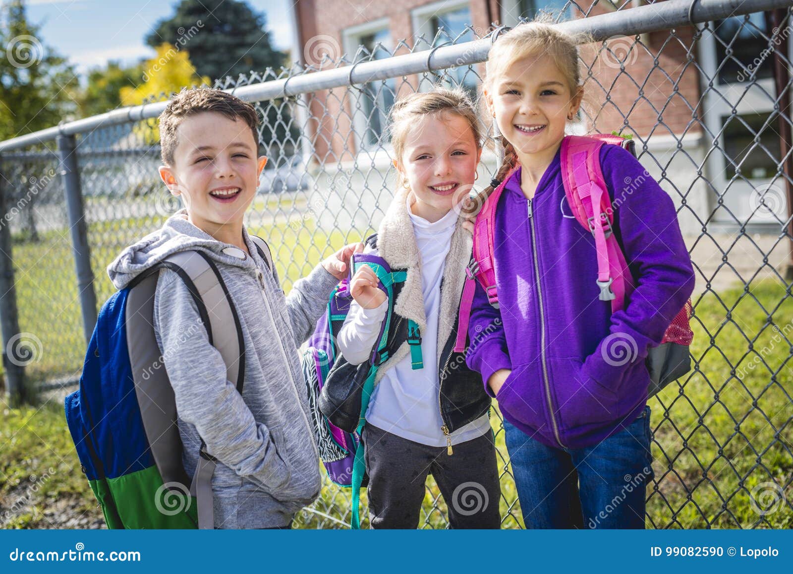 Students Outside School Standing Together Stock Photo - Image of ...