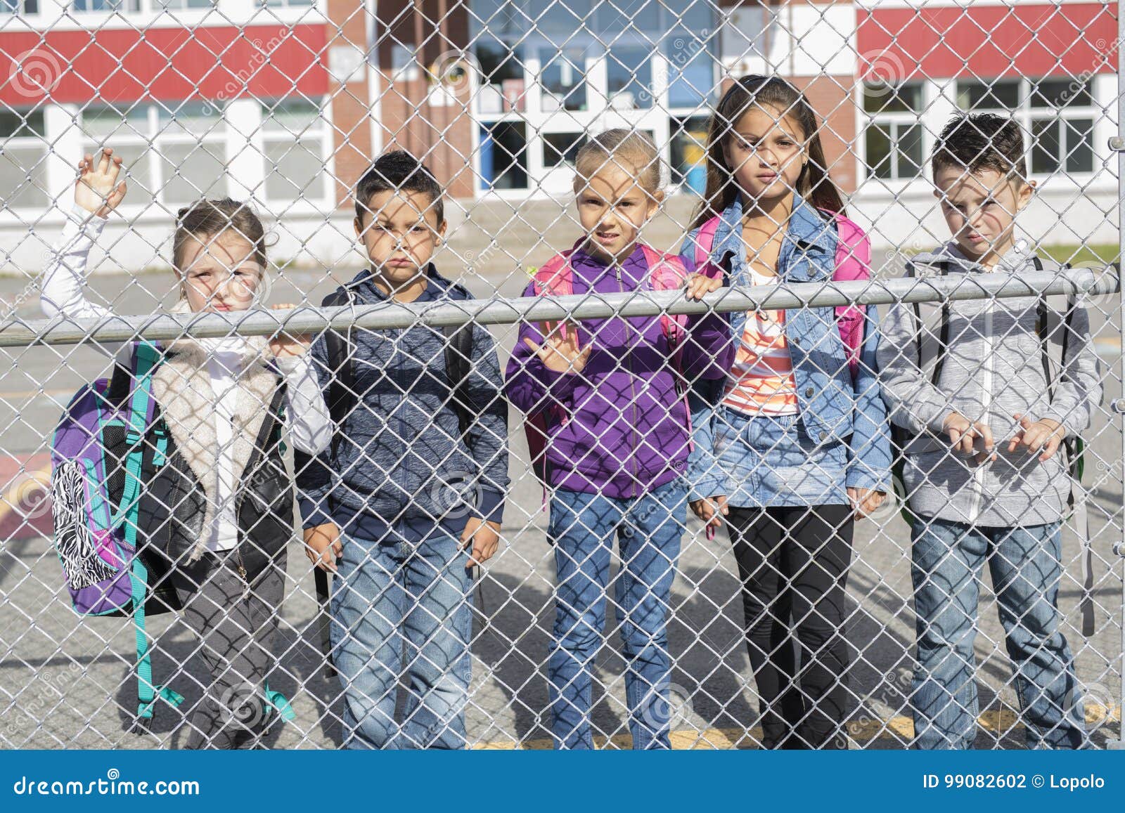 Students Outside School Standing Together Stock Photo - Image of child ...