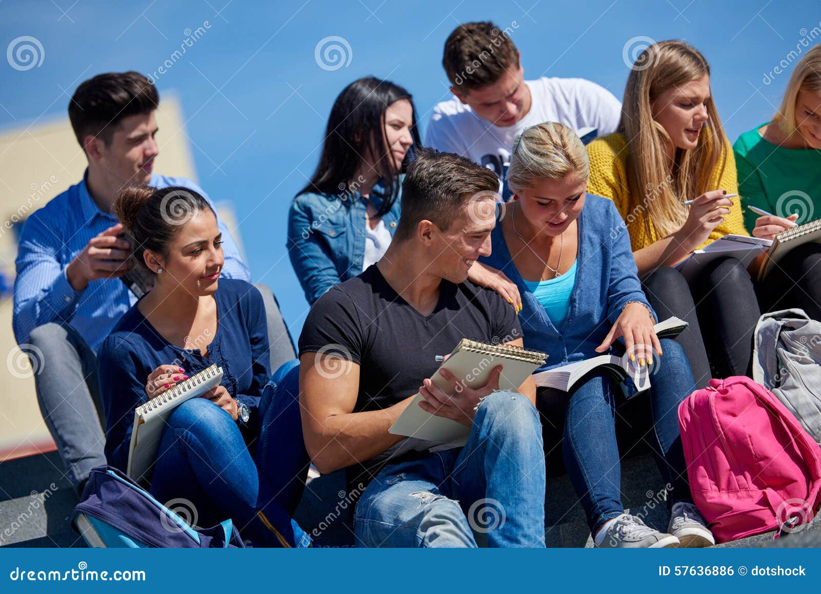 Students Outside Sitting on Steps Stock Photo - Image of colour, campus ...