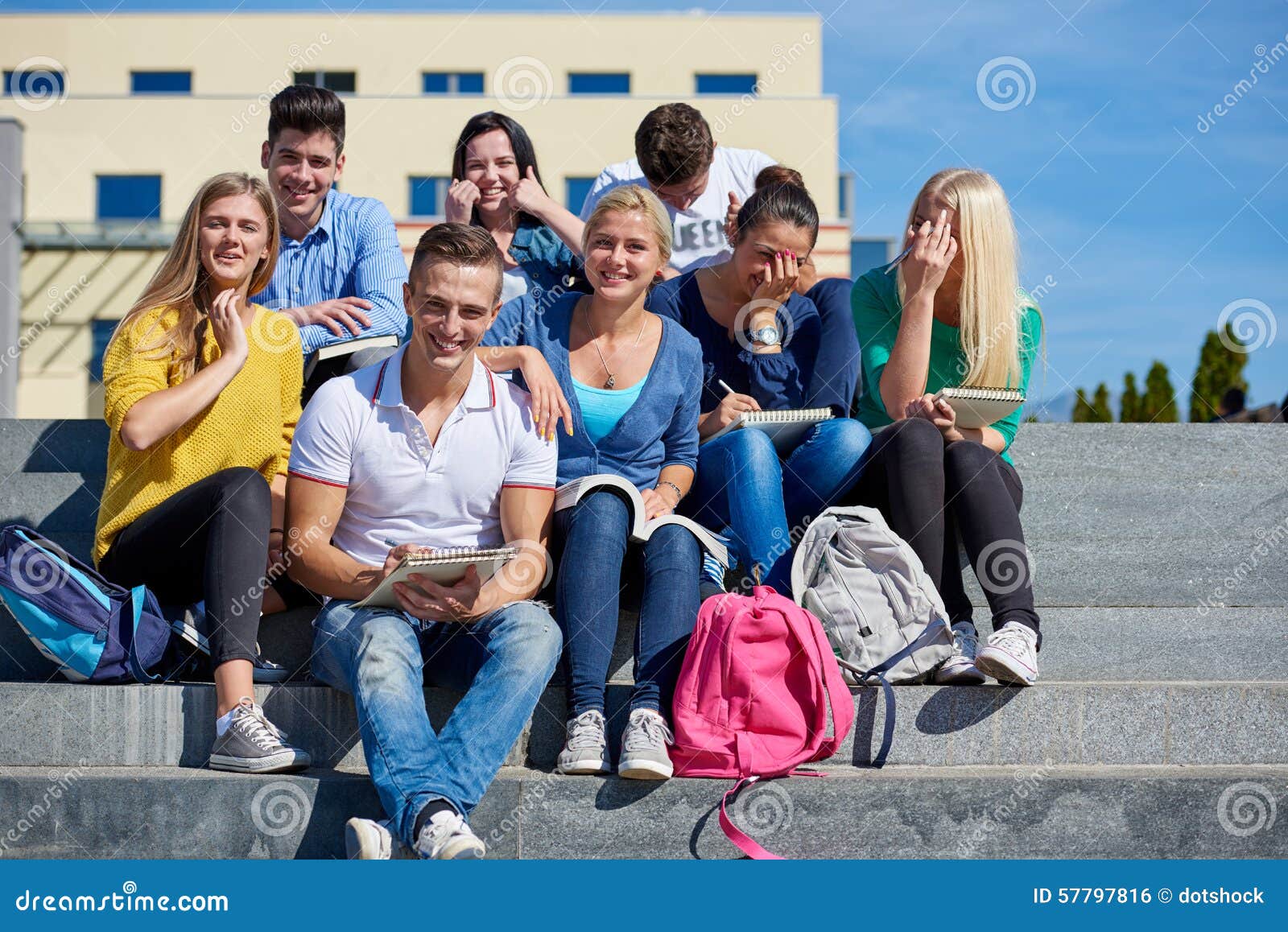 Students Outside Sitting on Steps Stock Photo - Image of city, person ...