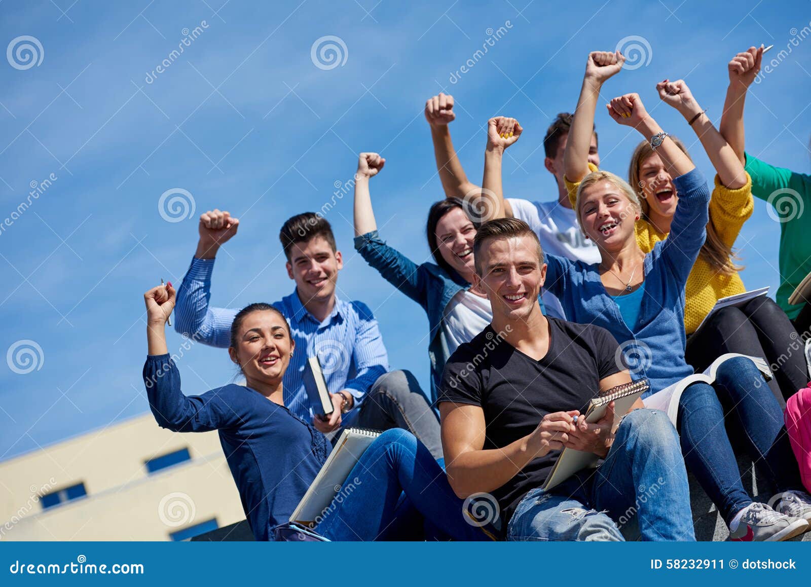 Students Outside Sitting on Steps Stock Image - Image of colour, face ...
