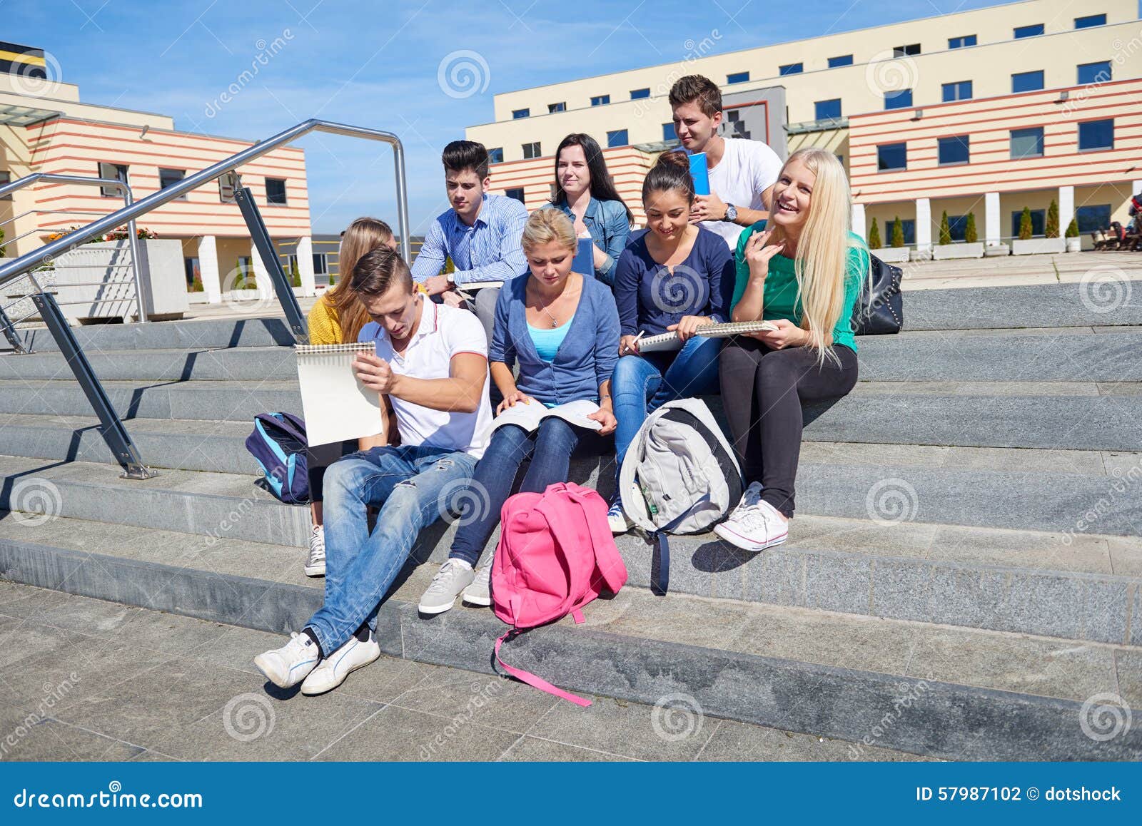 Students Outside Sitting on Steps Stock Photo - Image of beautiful ...