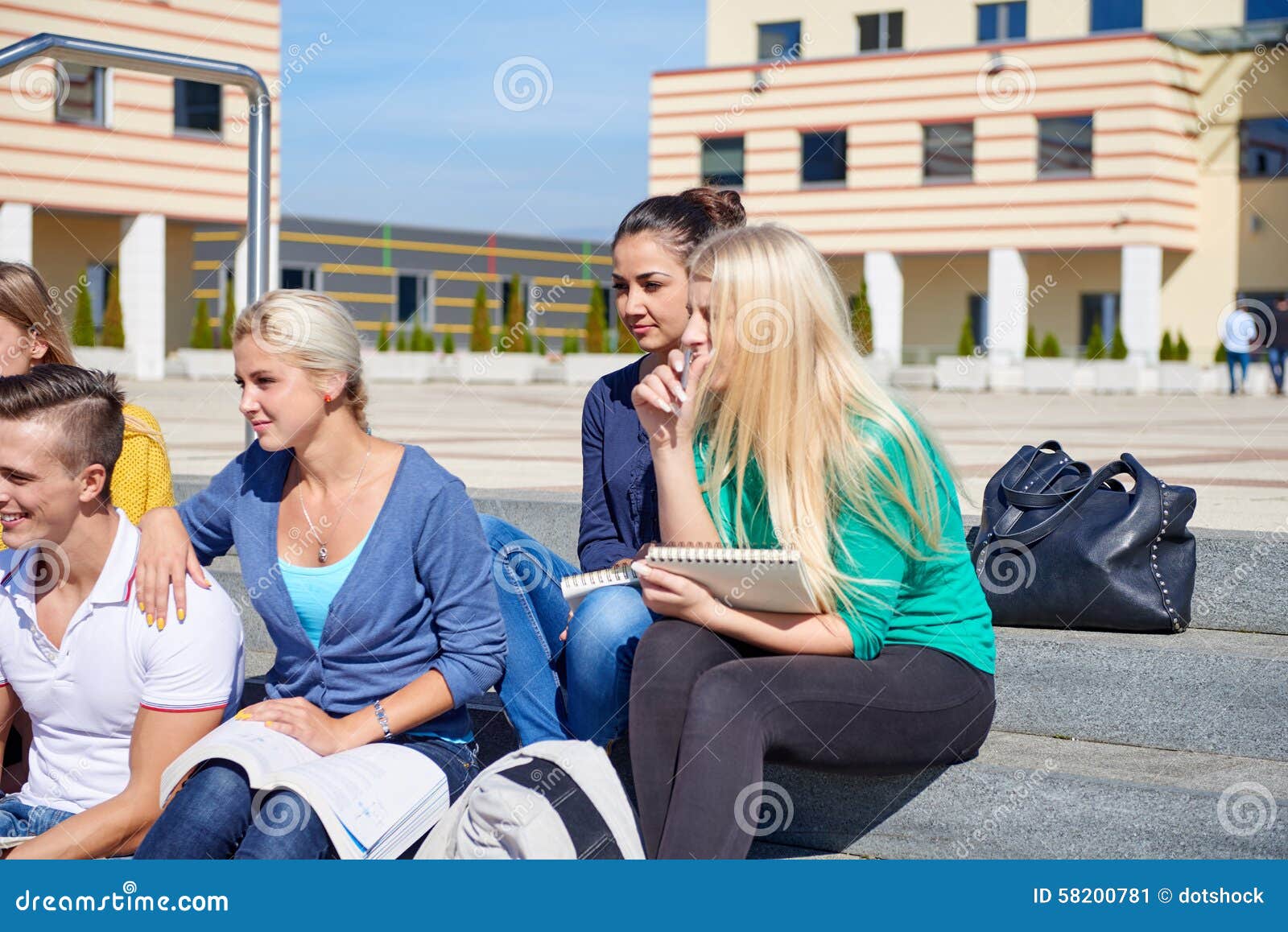 Students Outside Sitting on Steps Stock Image - Image of person ...