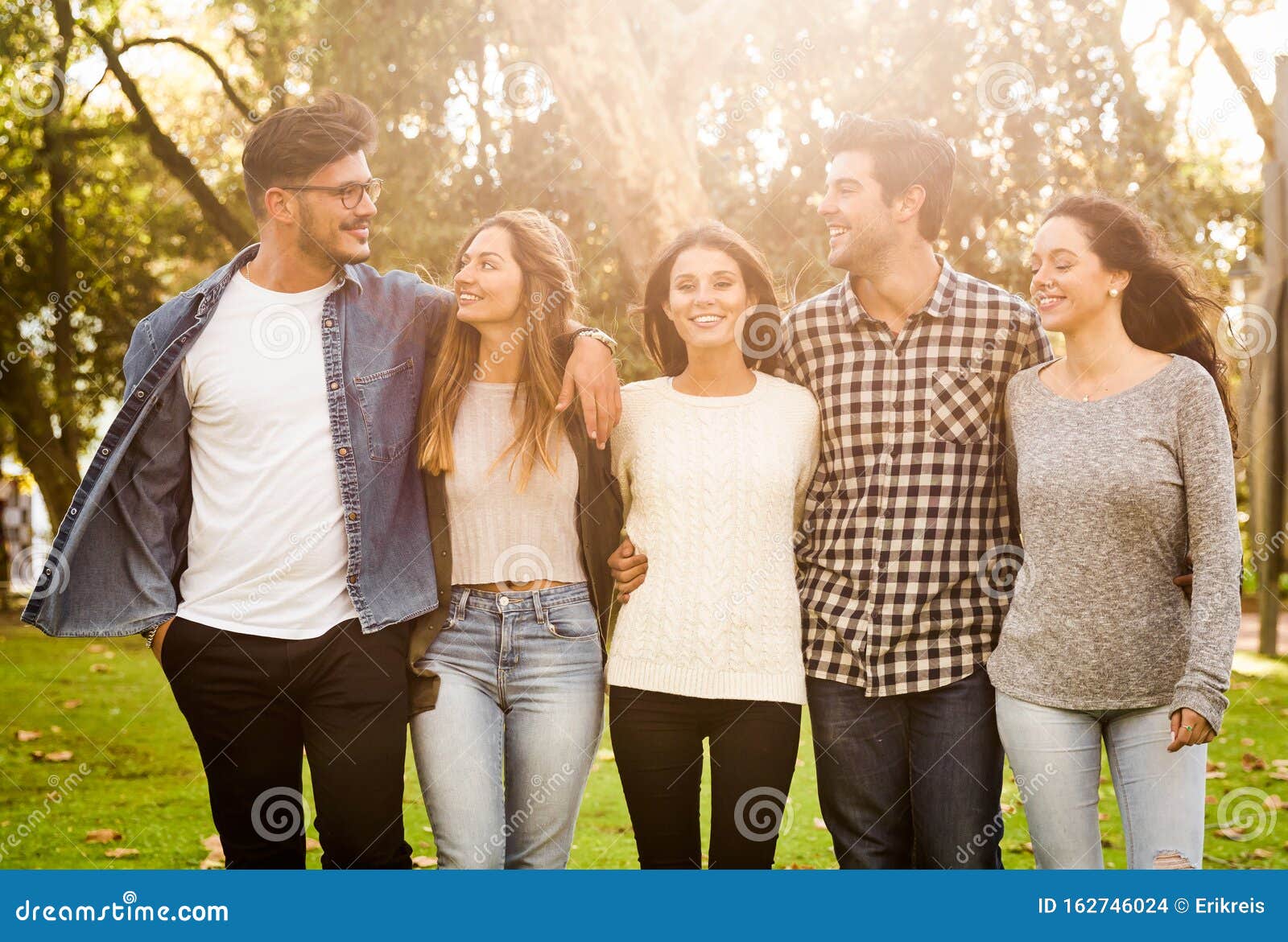Students in the park stock photo. Image of park, outdoors - 162746024