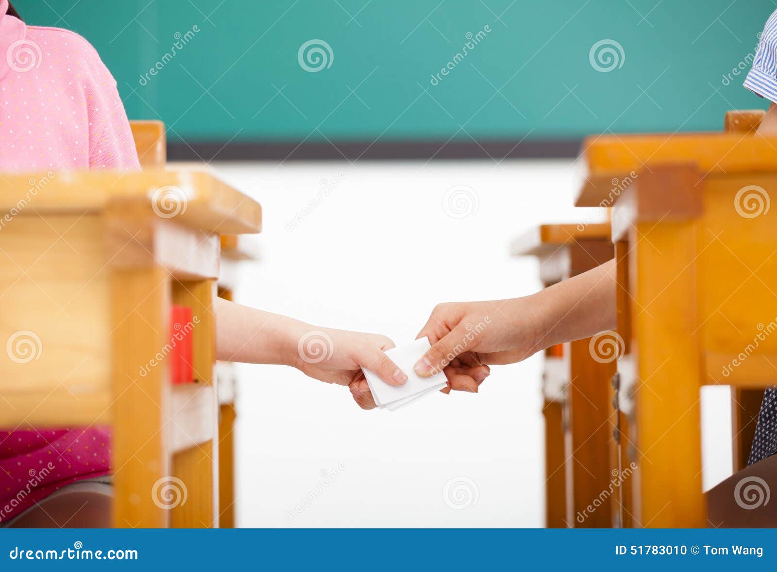 Students Passing Notes in the Classroom Stock Photo - Image of note ...
