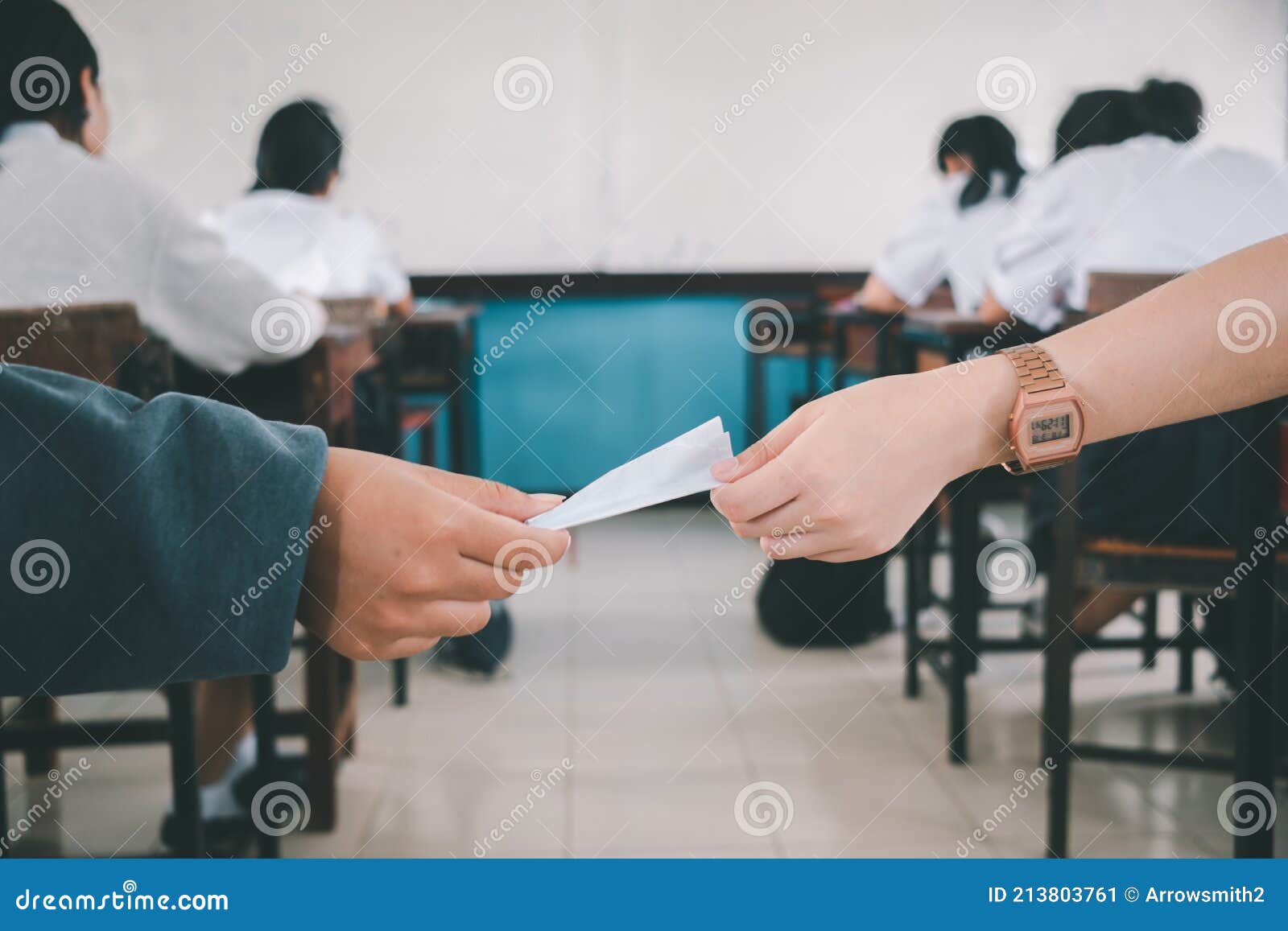 Students Passing Notes To Each Other Secretly during Class Stock Image ...