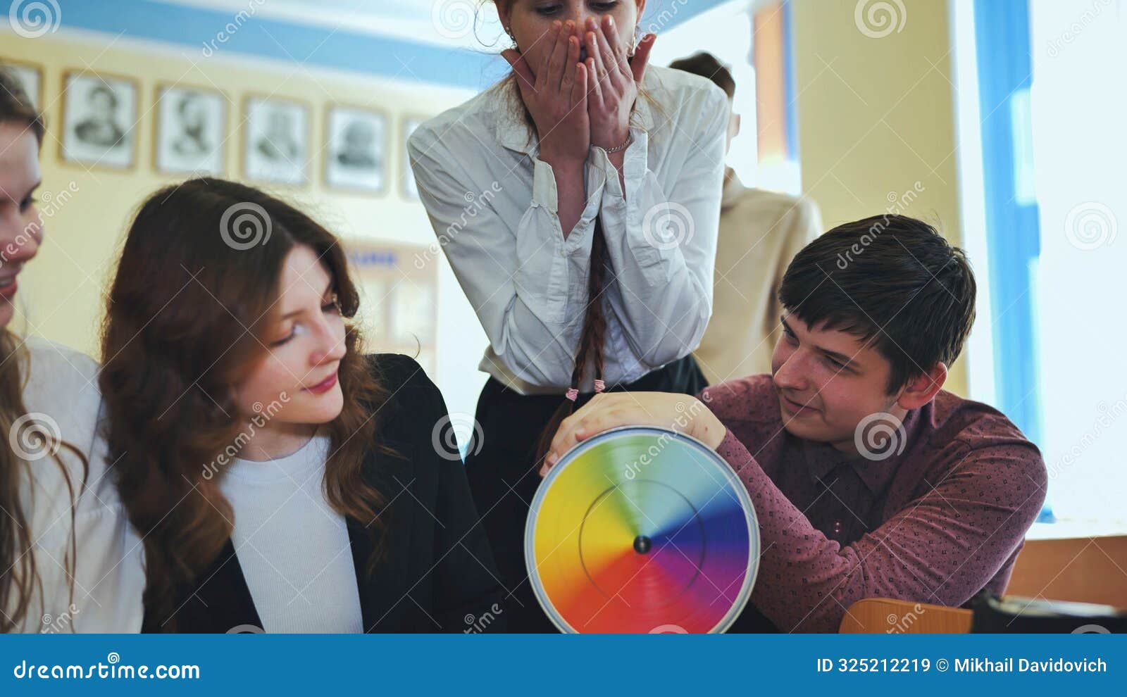 Students in Physics Class Spin Newton& X27;s Colorful Wheel. Stock ...