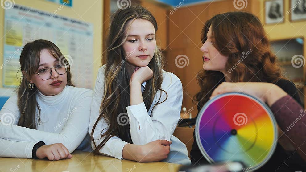 Students in Physics Class Spin Newton S Multicolored Disk. Stock Image ...