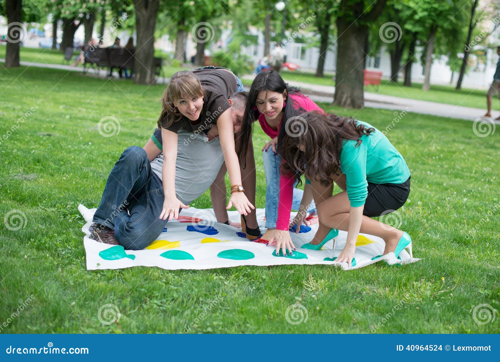 Students Play the Game Twister Stock Photo - Image of friends, female ...