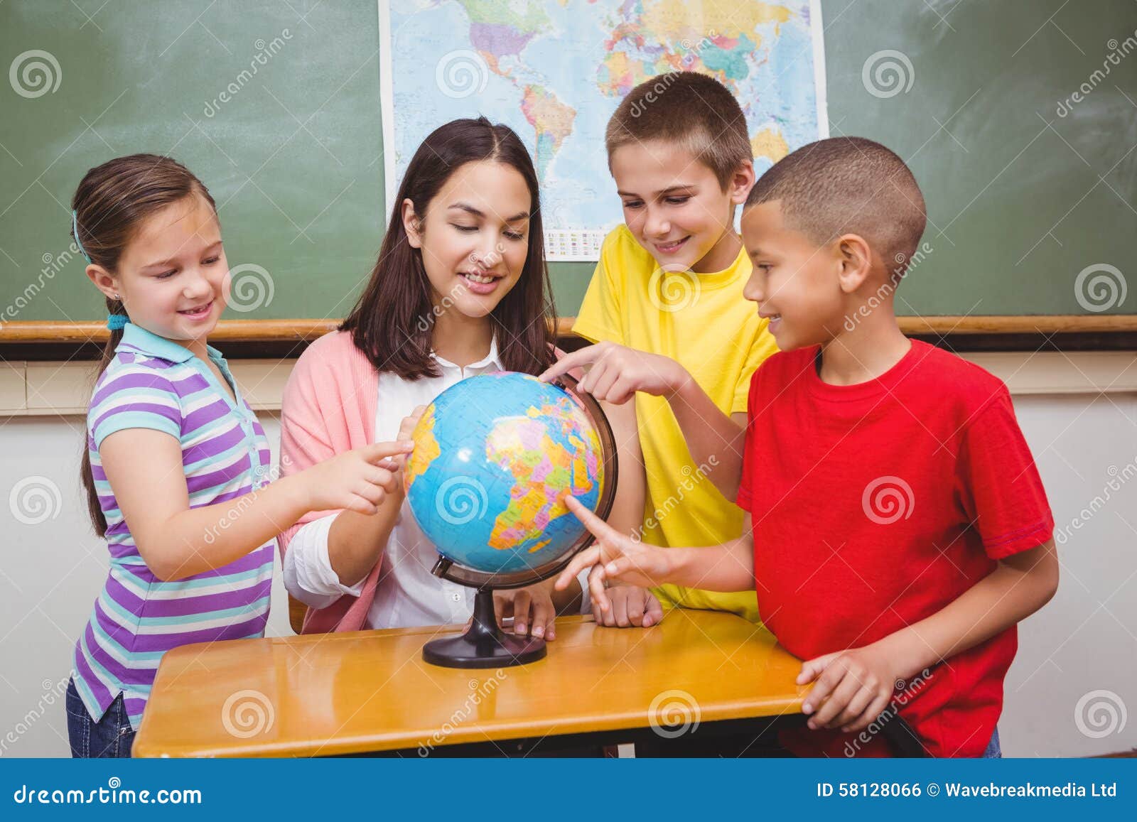 Students Pointing To Places on a Globe Stock Photo - Image of adult ...