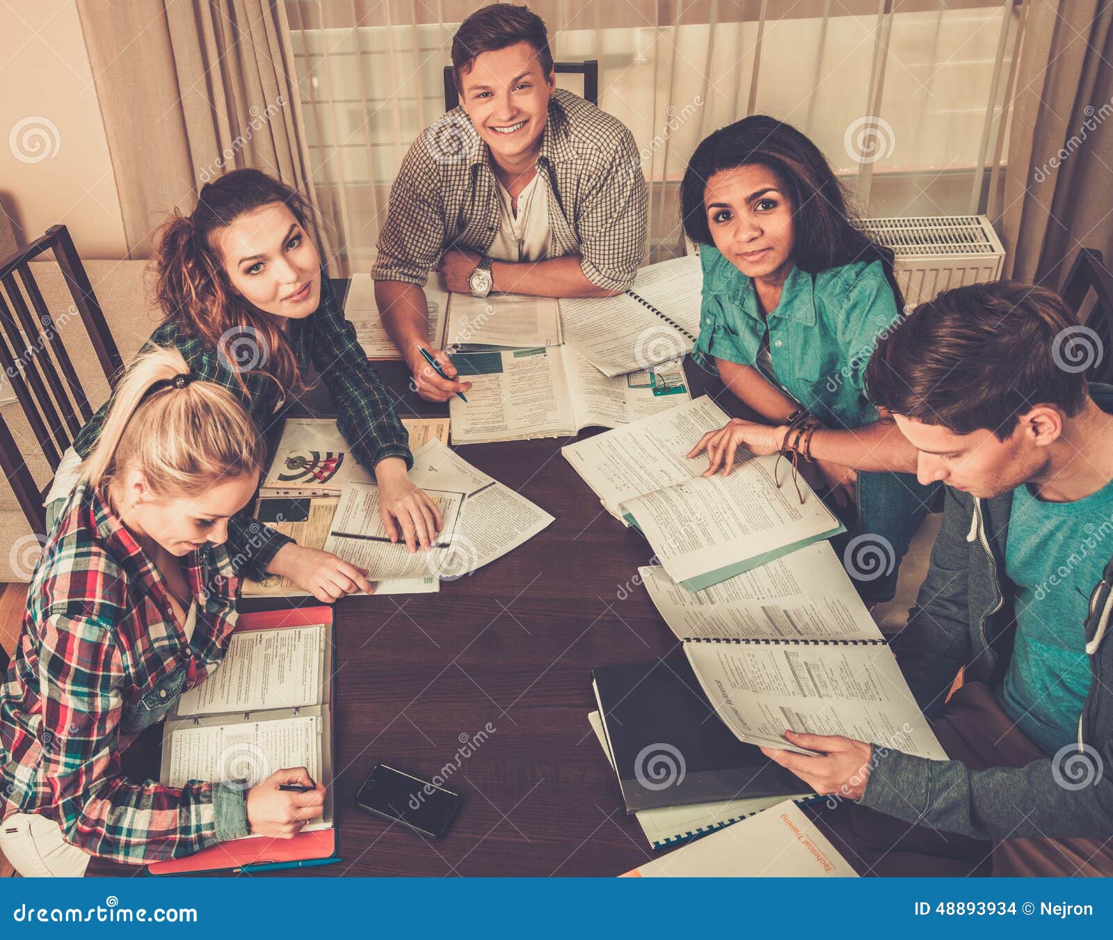 Students Preparing for Exams Stock Photo - Image of friendly, notebooks ...