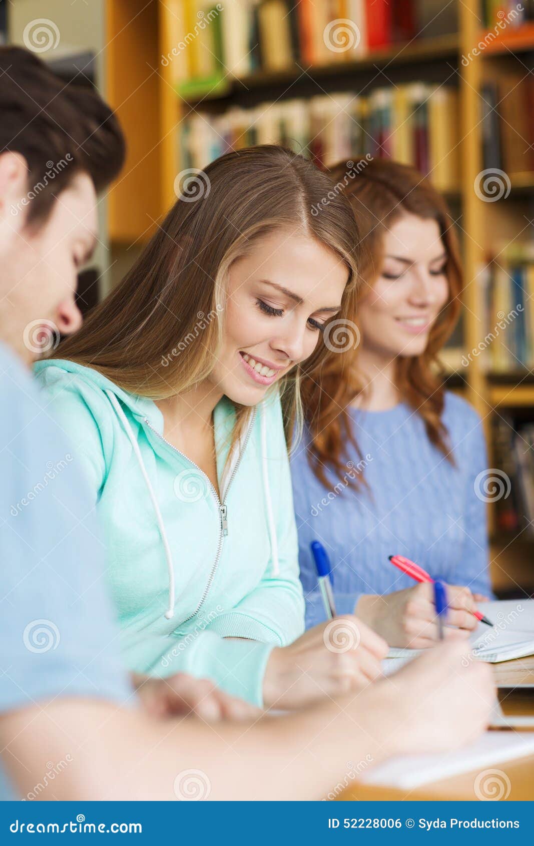 Students Preparing To Exam and Writing in Library Stock Photo - Image ...