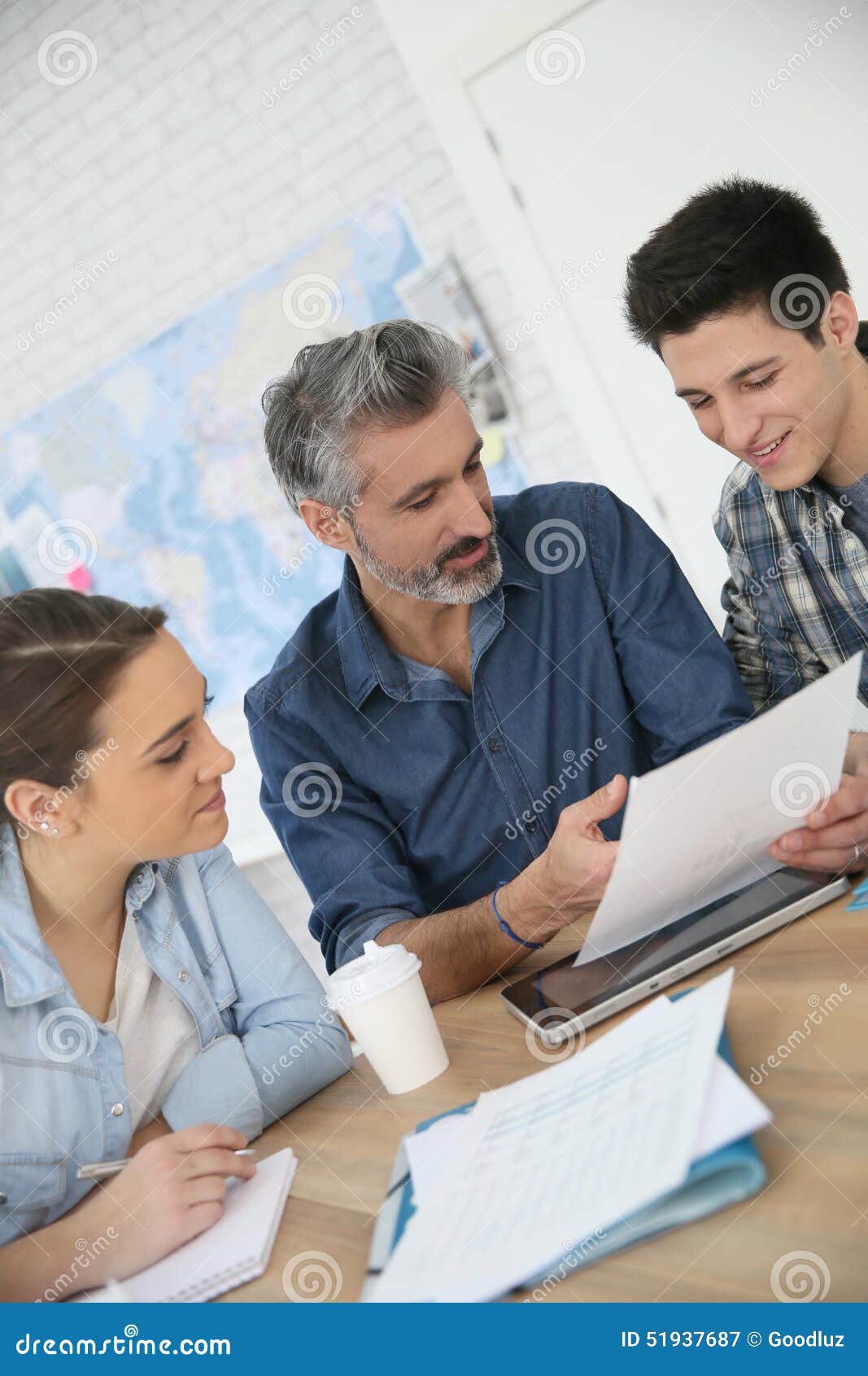 Students with Professor Working on Project Stock Image - Image of beard ...