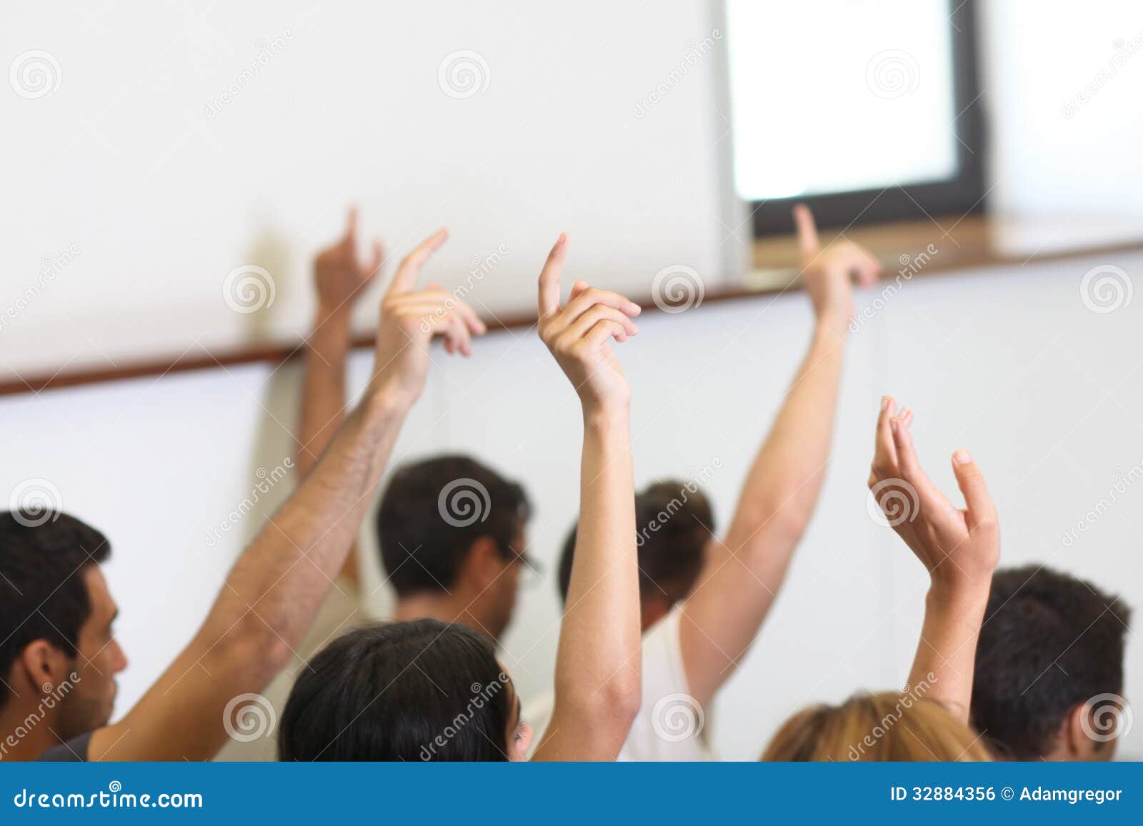 Students Put Hand Up In Class Room Stock Photo - Image: 32884356