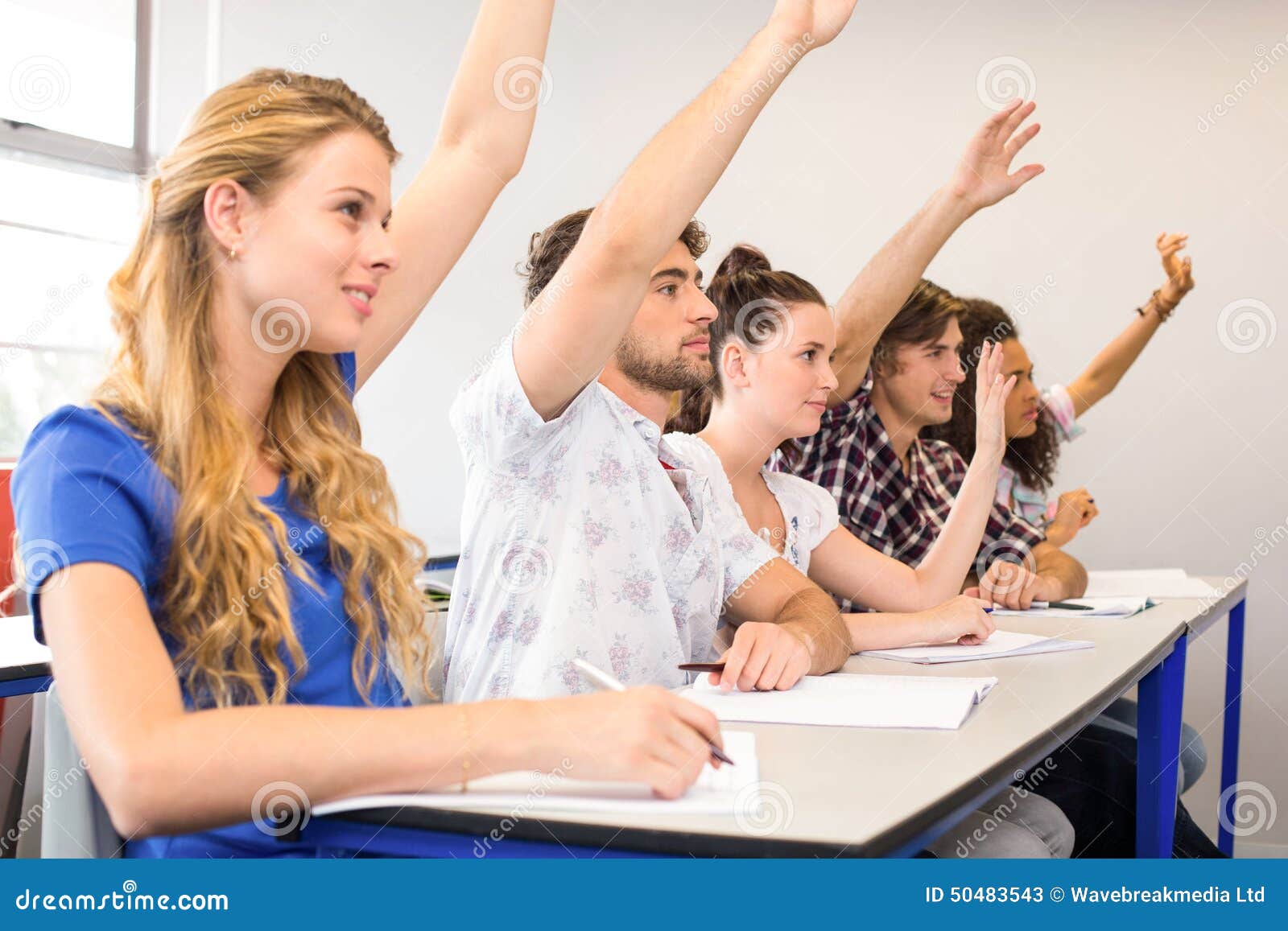 High School Student Raising Hand