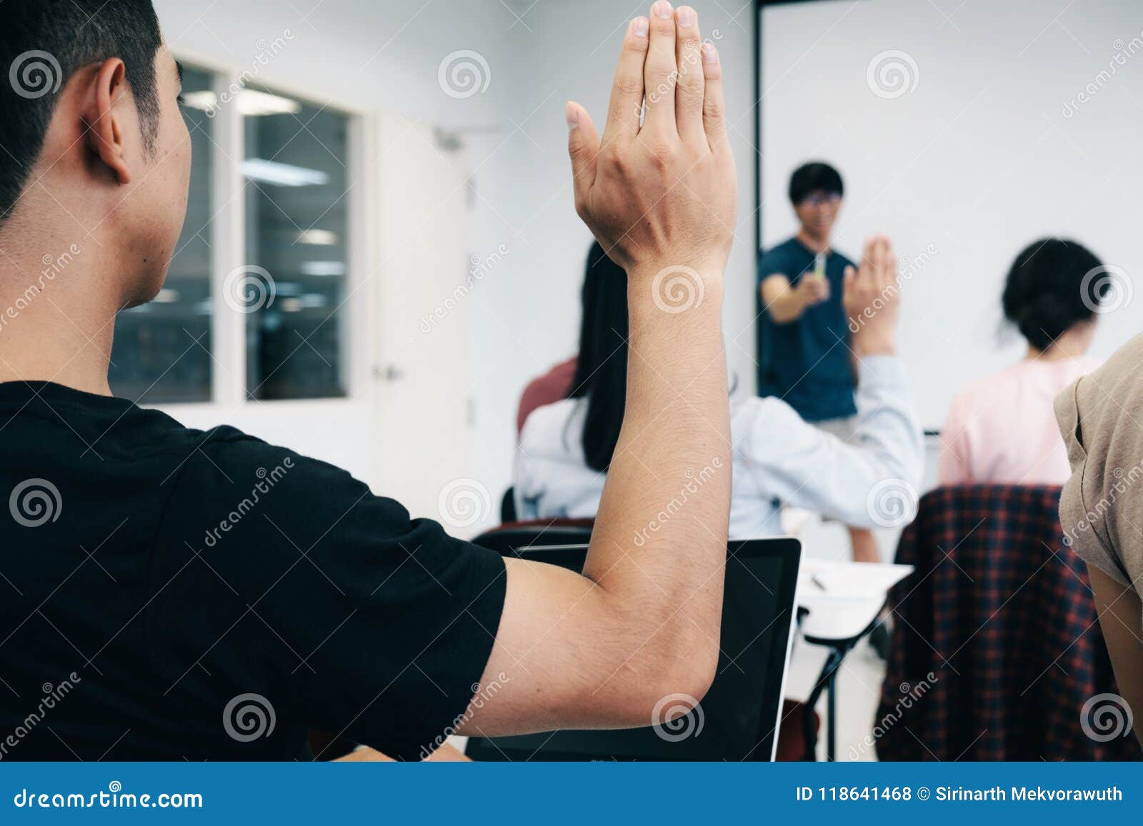 Students Raising Hands in College Lecture Room. Stock Photo - Image of ...