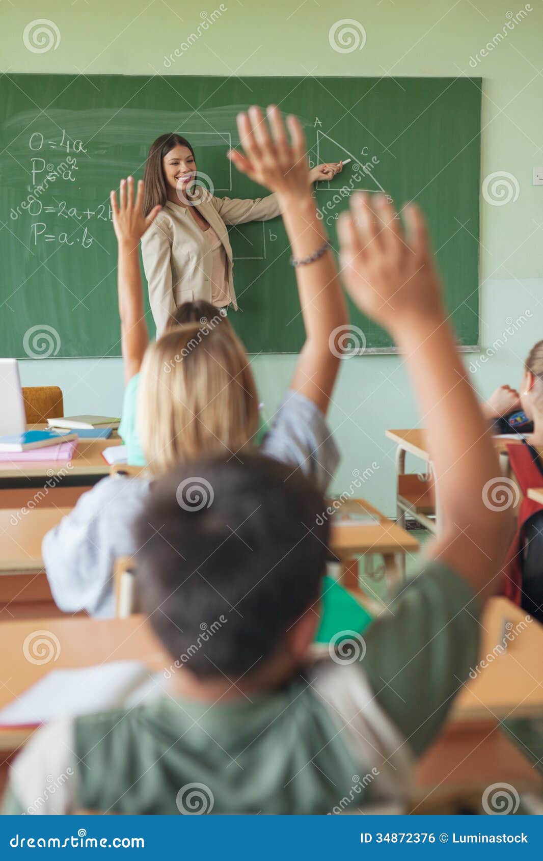 Students Raising Hands in a Maths Lesson Stock Photo - Image of ...