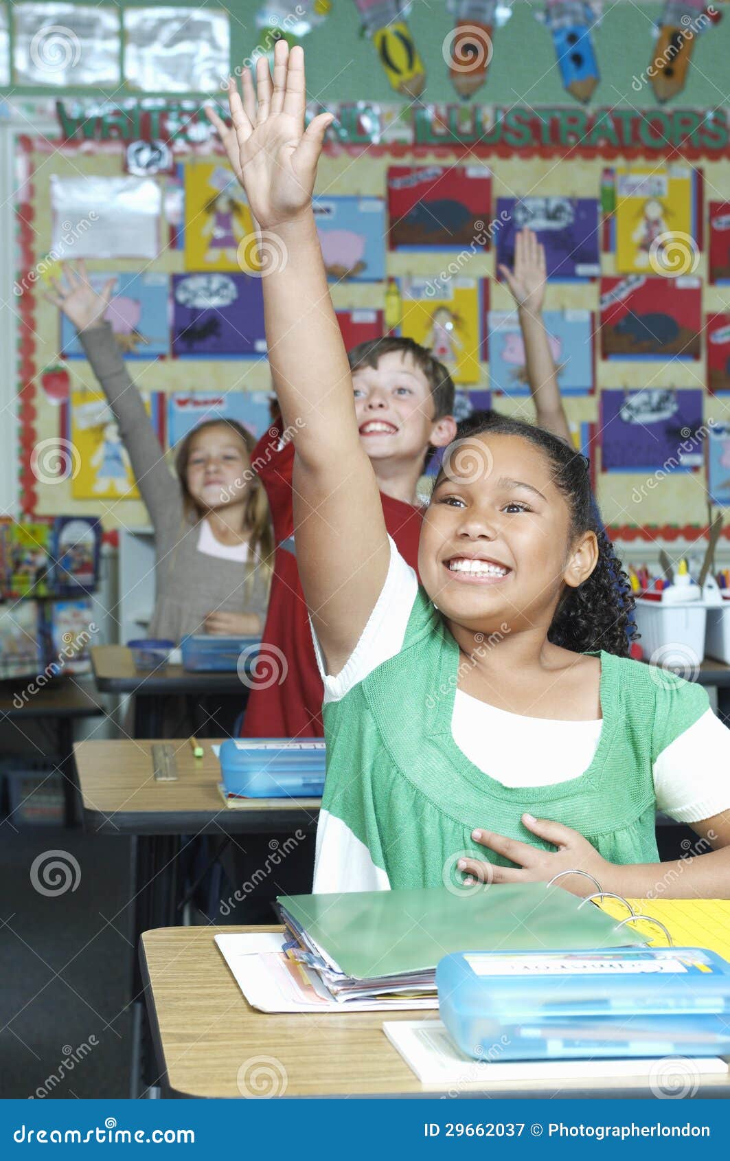 Student Raising Hand In Class