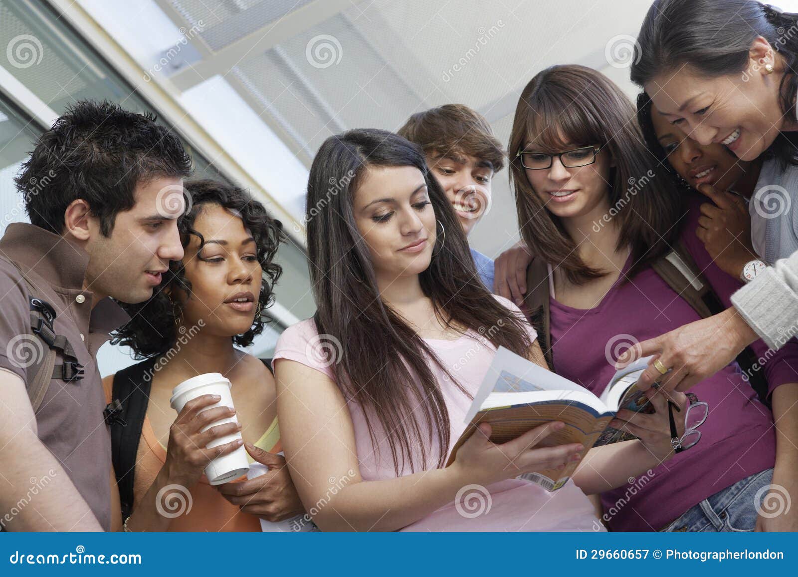 Students Reading Book with Professor Stock Image - Image of friend ...