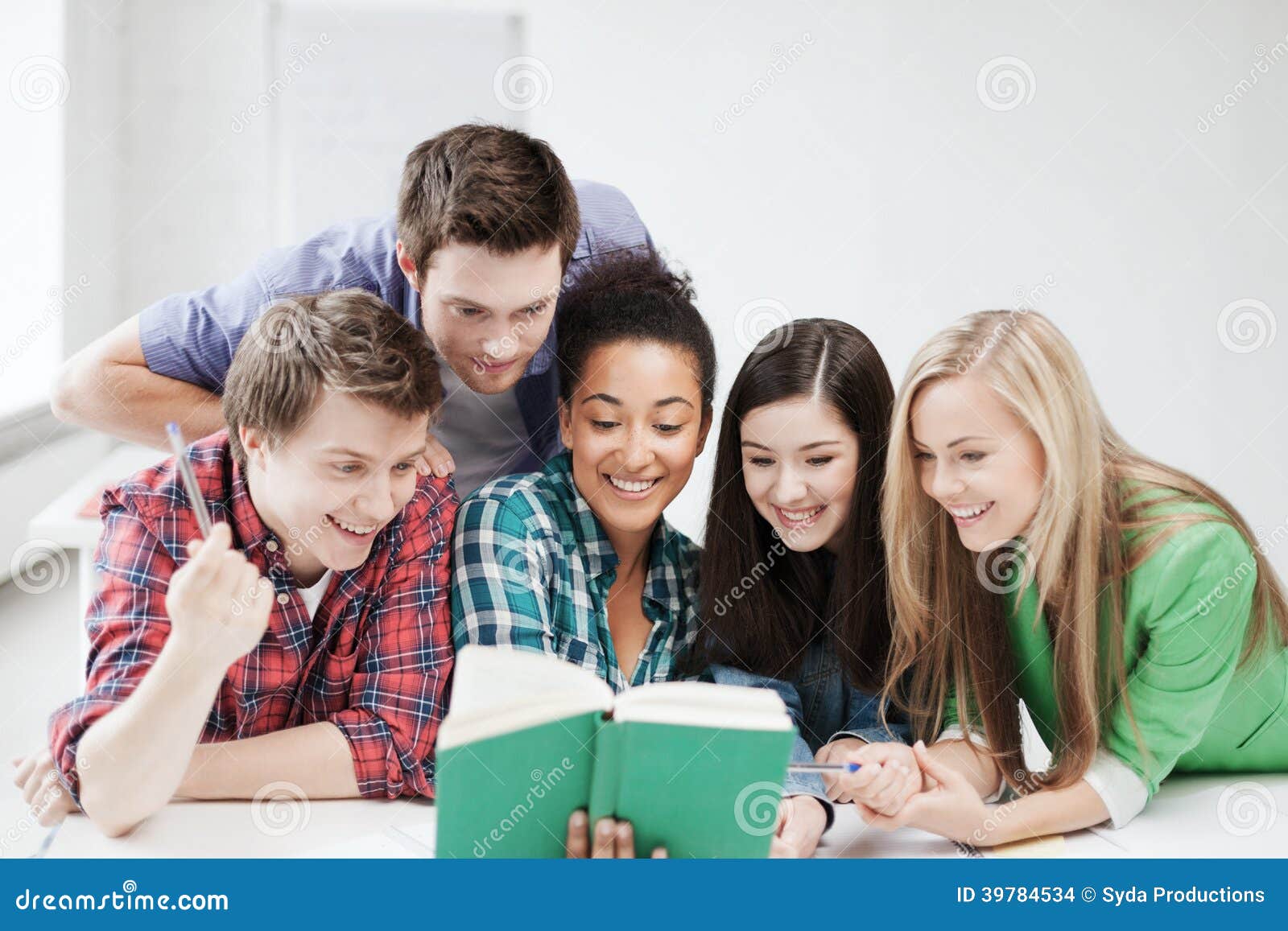 Students Reading Book at School Stock Photo - Image of book, classroom ...