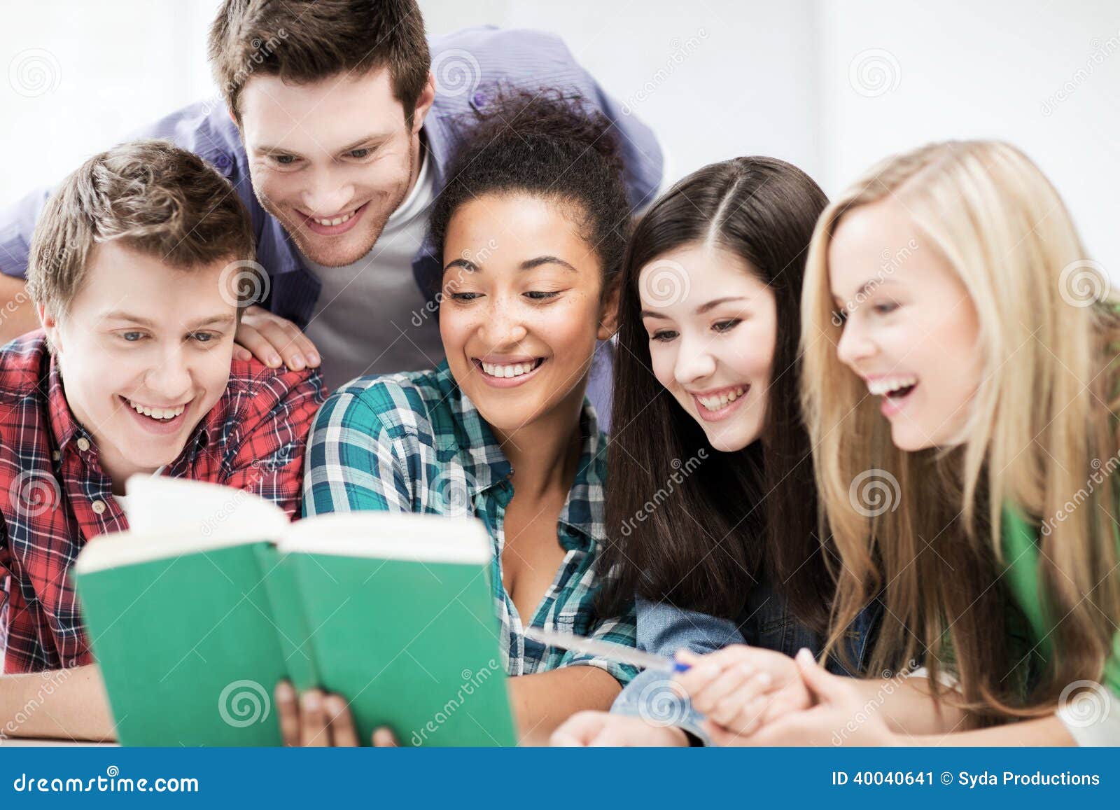 Students Reading Book at School Stock Image - Image of female, laughing ...