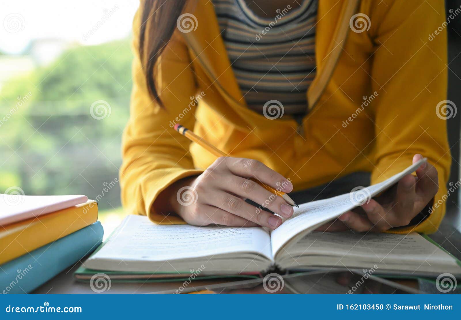 Students are Reading Books and Taking Notes for Exam Preparation Stock ...