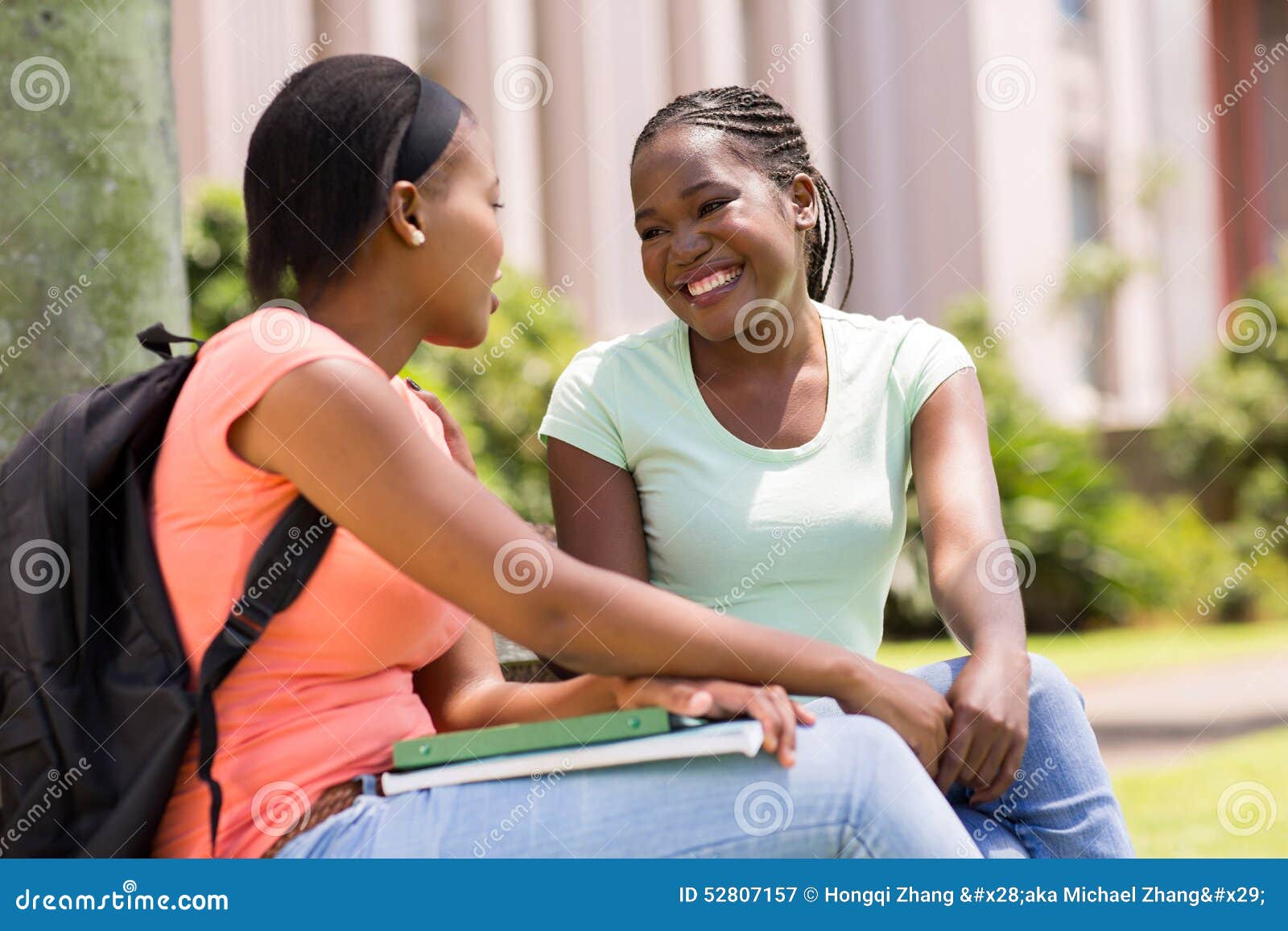 Students relaxing outdoors stock image. Image of college - 52807157