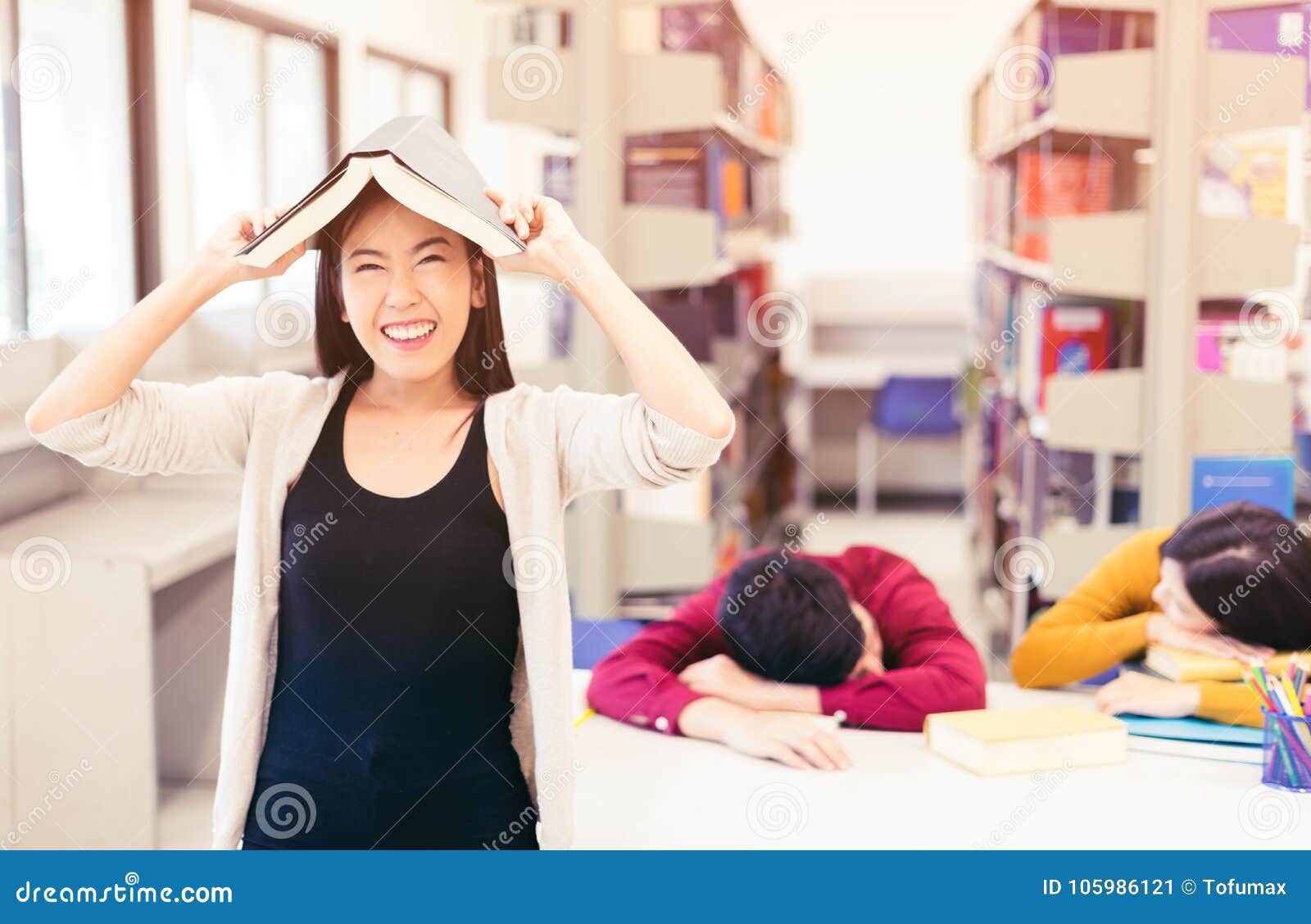 Students rest in library stock image. Image of tired - 105986121