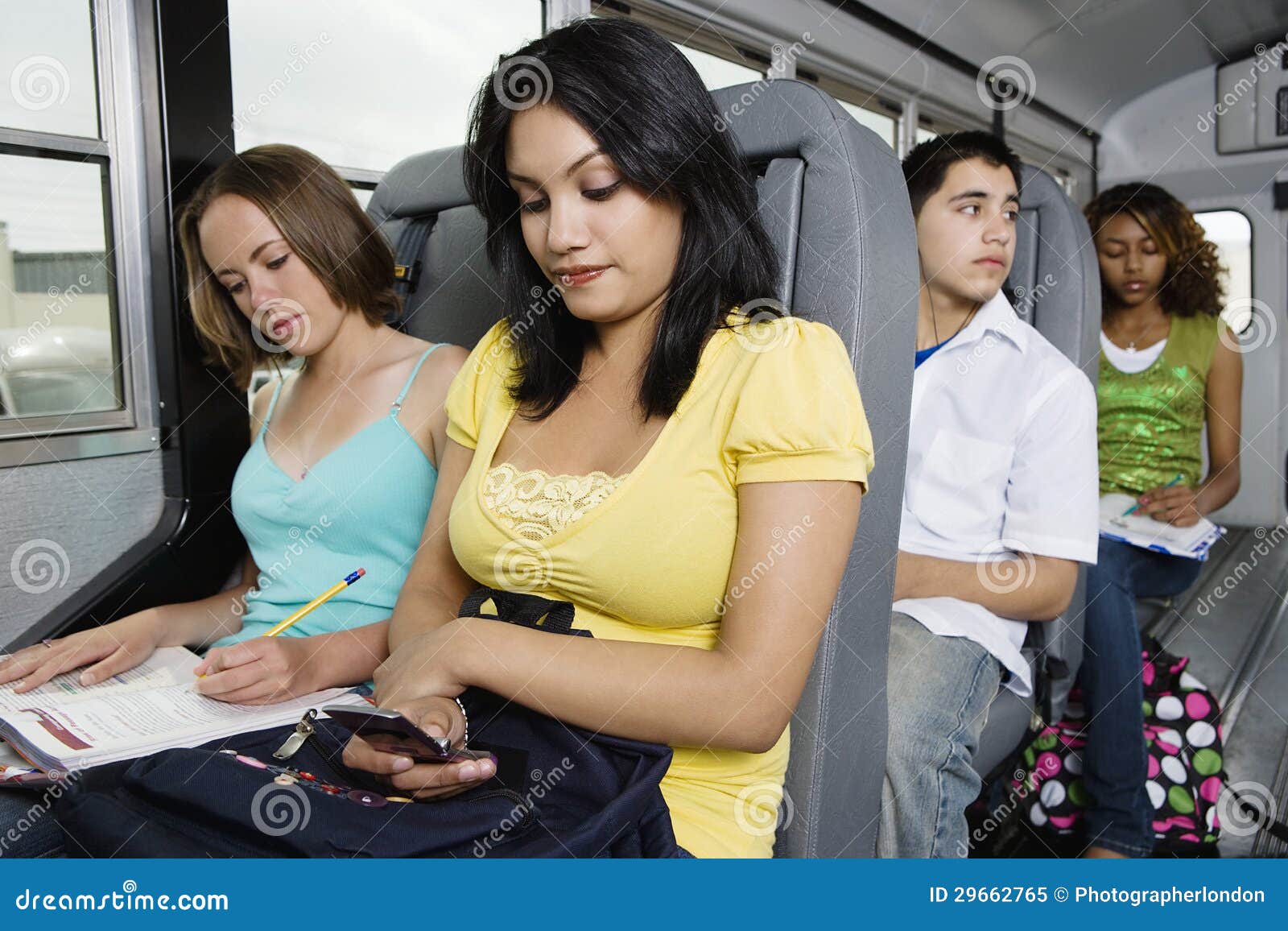 Students Riding School Bus stock image. Image of caucasian - 29662765