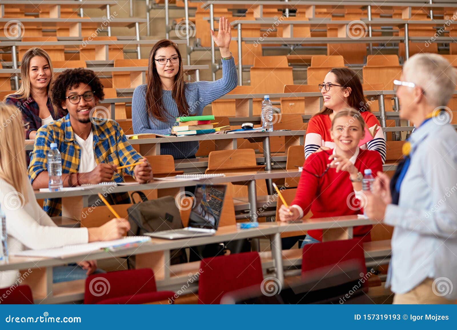 Students Rising Hands To Answer the Question in Lecture Stock Image ...