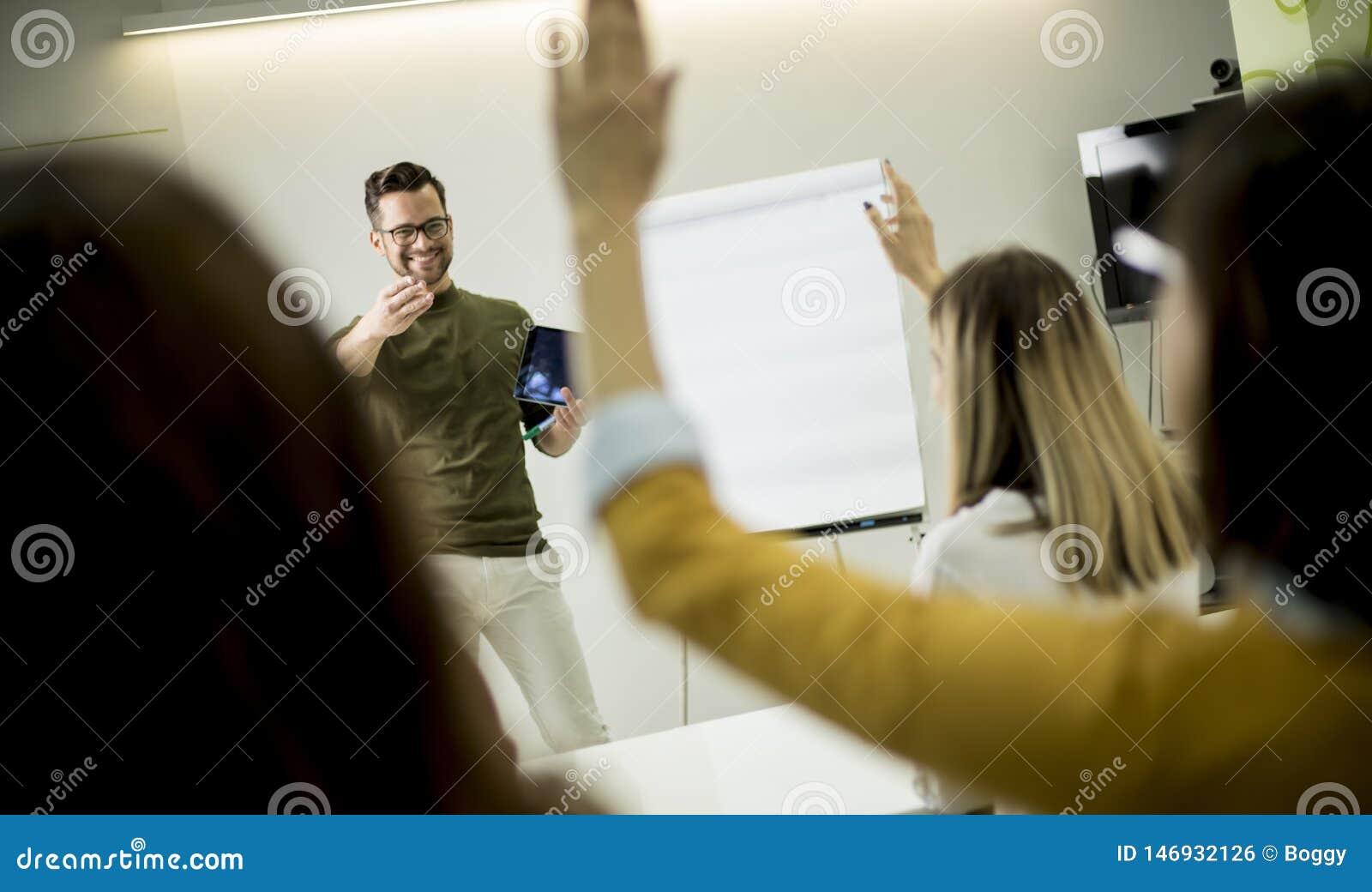 Students Rising Hands To Answer the Question during the Workshop ...