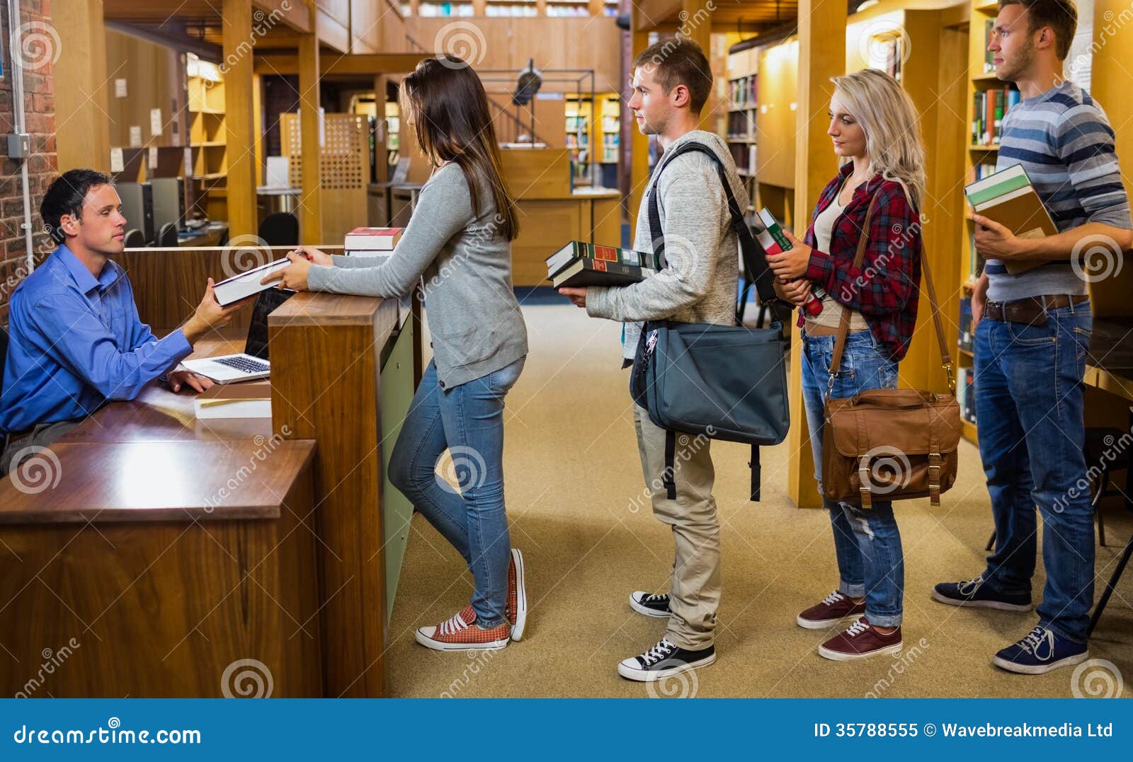 Students in a Row at the Library Counter Stock Image - Image of indoors ...