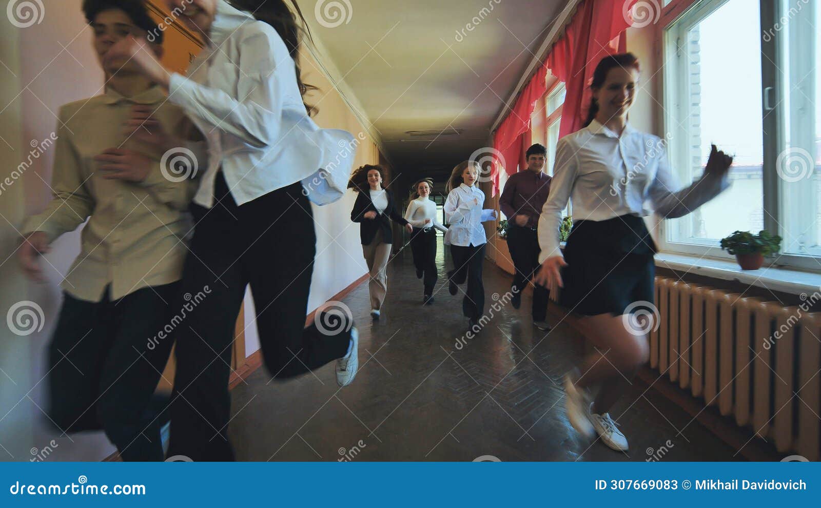 The Students are Running Down the Hallway of the School. Stock Image ...