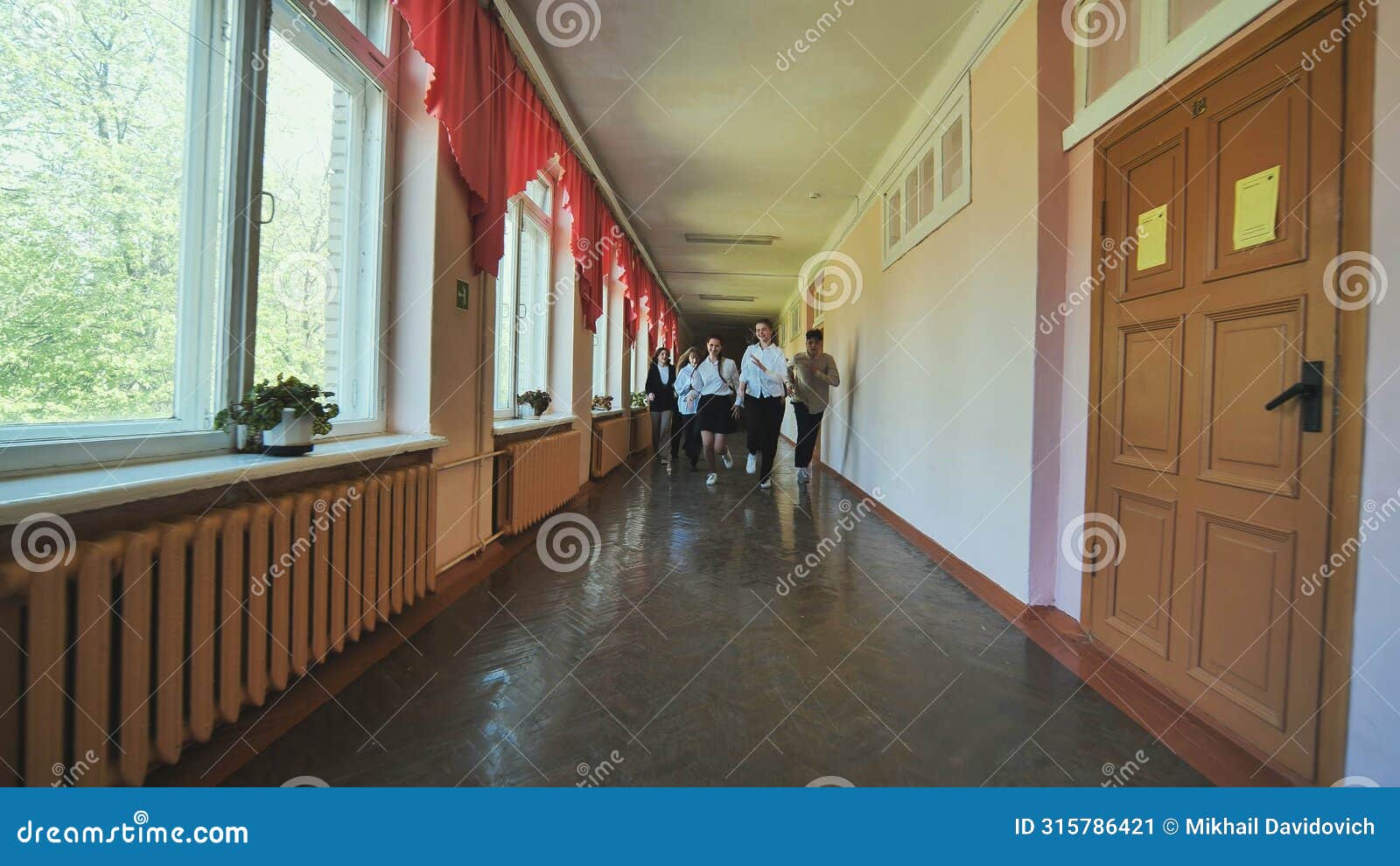 The Students are Running Down the Hallway of the School. Stock Image ...