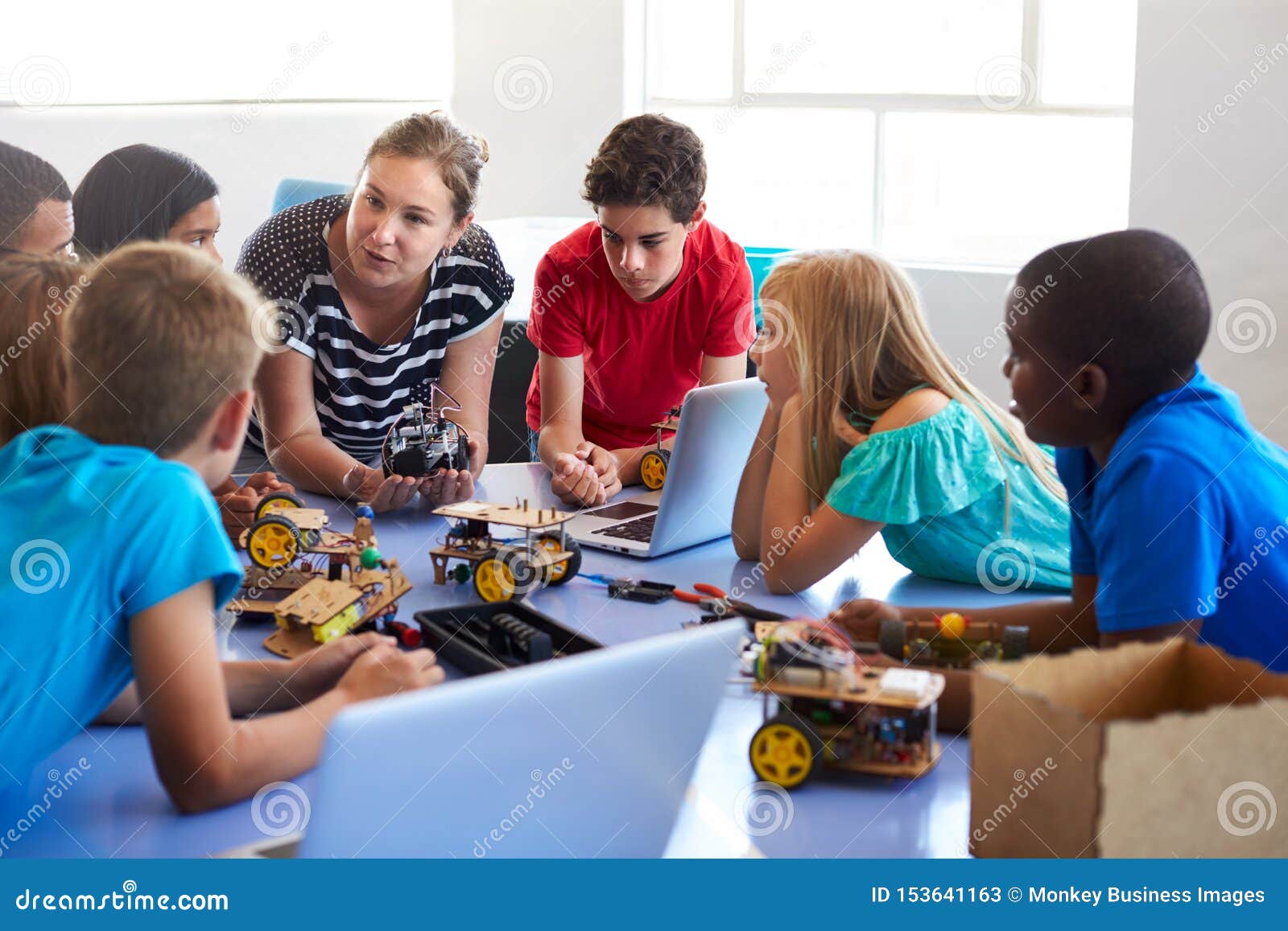 Students in after School Computer Coding Class Building and Learning To ...