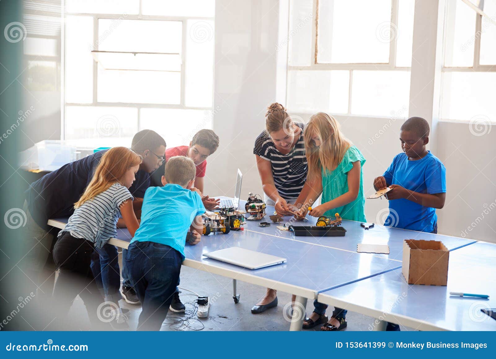 Students in after School Computer Coding Class Building and Learning To ...