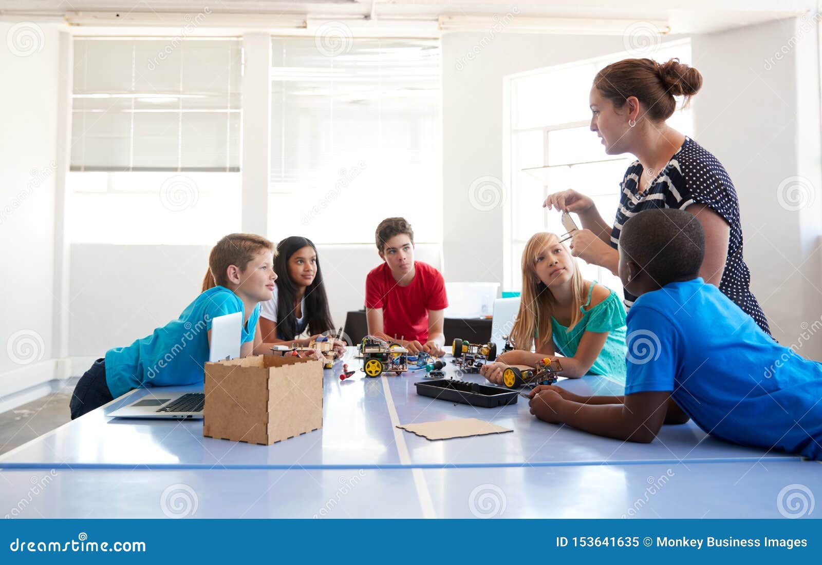 Students in after School Computer Coding Class Building and Learning To ...