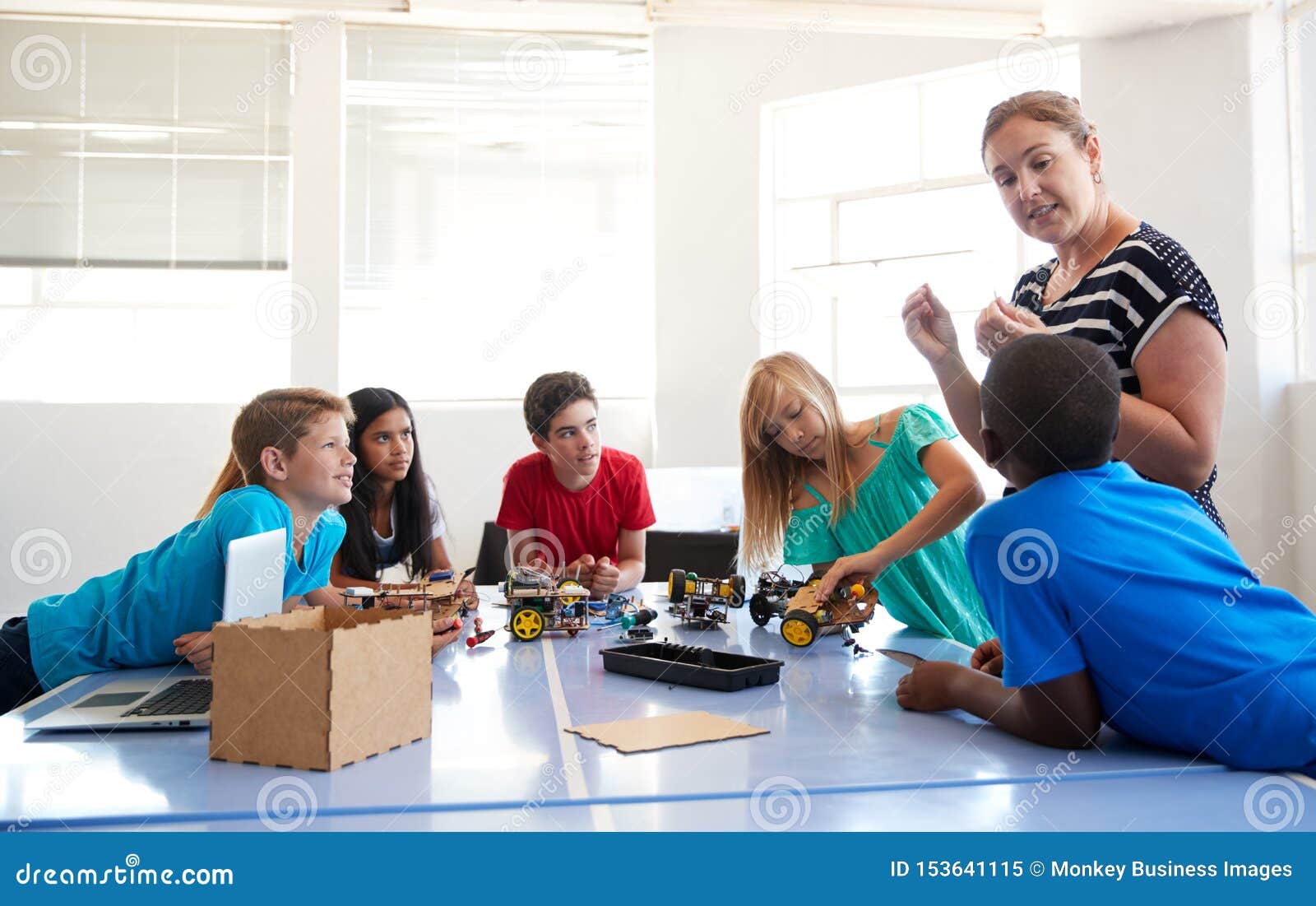 Students in after School Computer Coding Class Building and Learning To ...